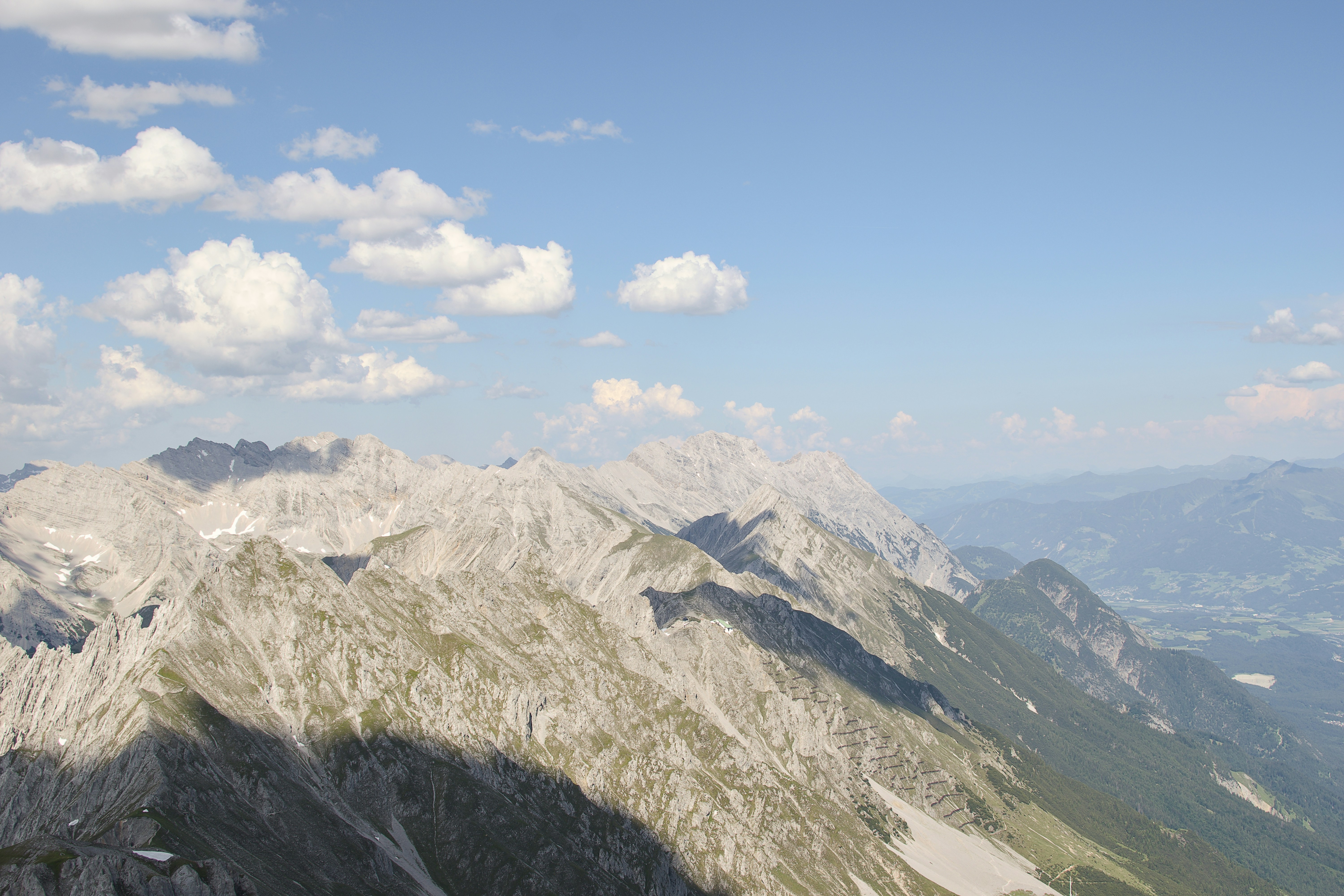 Sunlit Backbone: Alpine Ridge Claiming the Open Sky