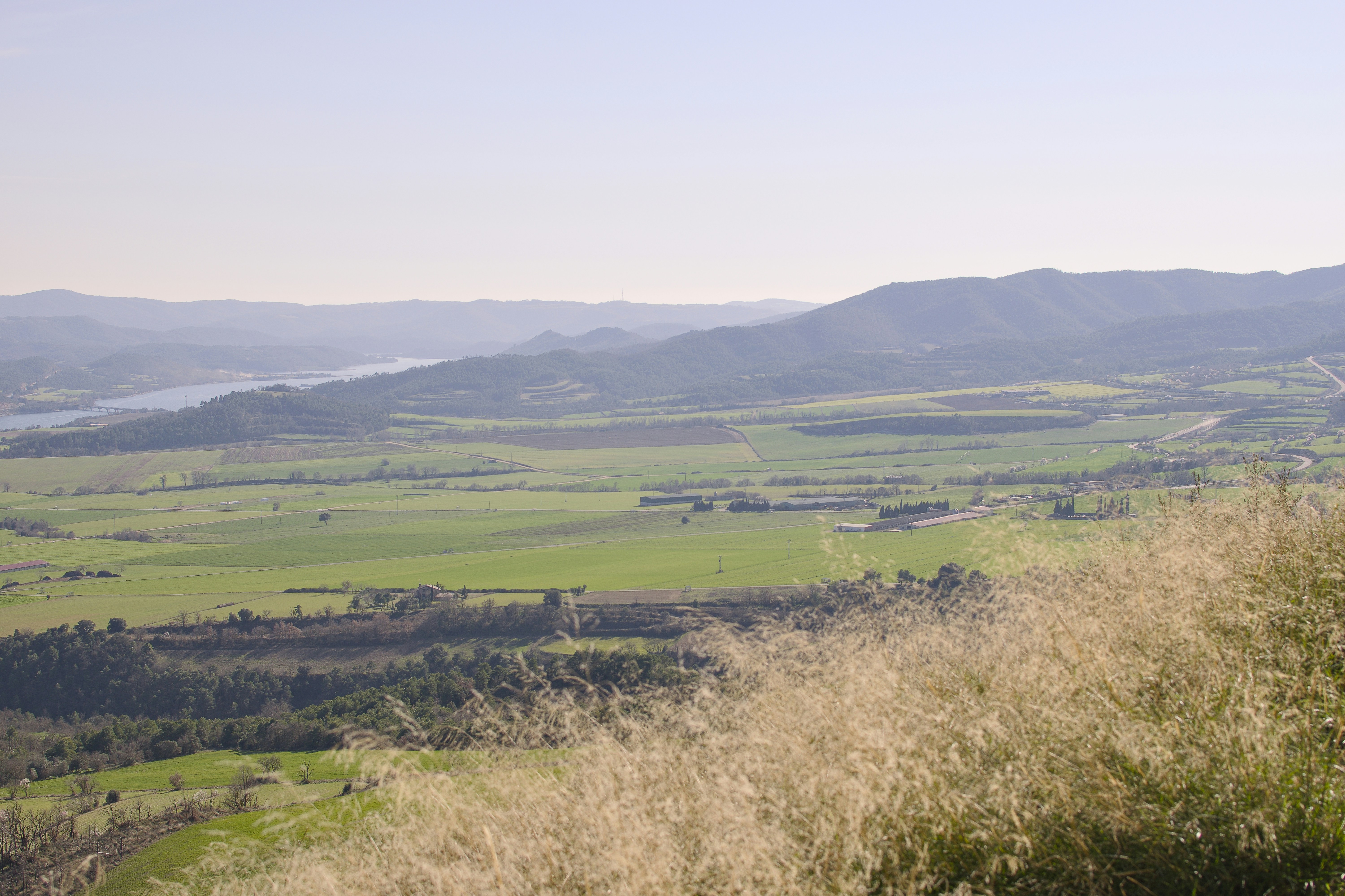Rolling Valleys and Distant Ridges under Warm Light