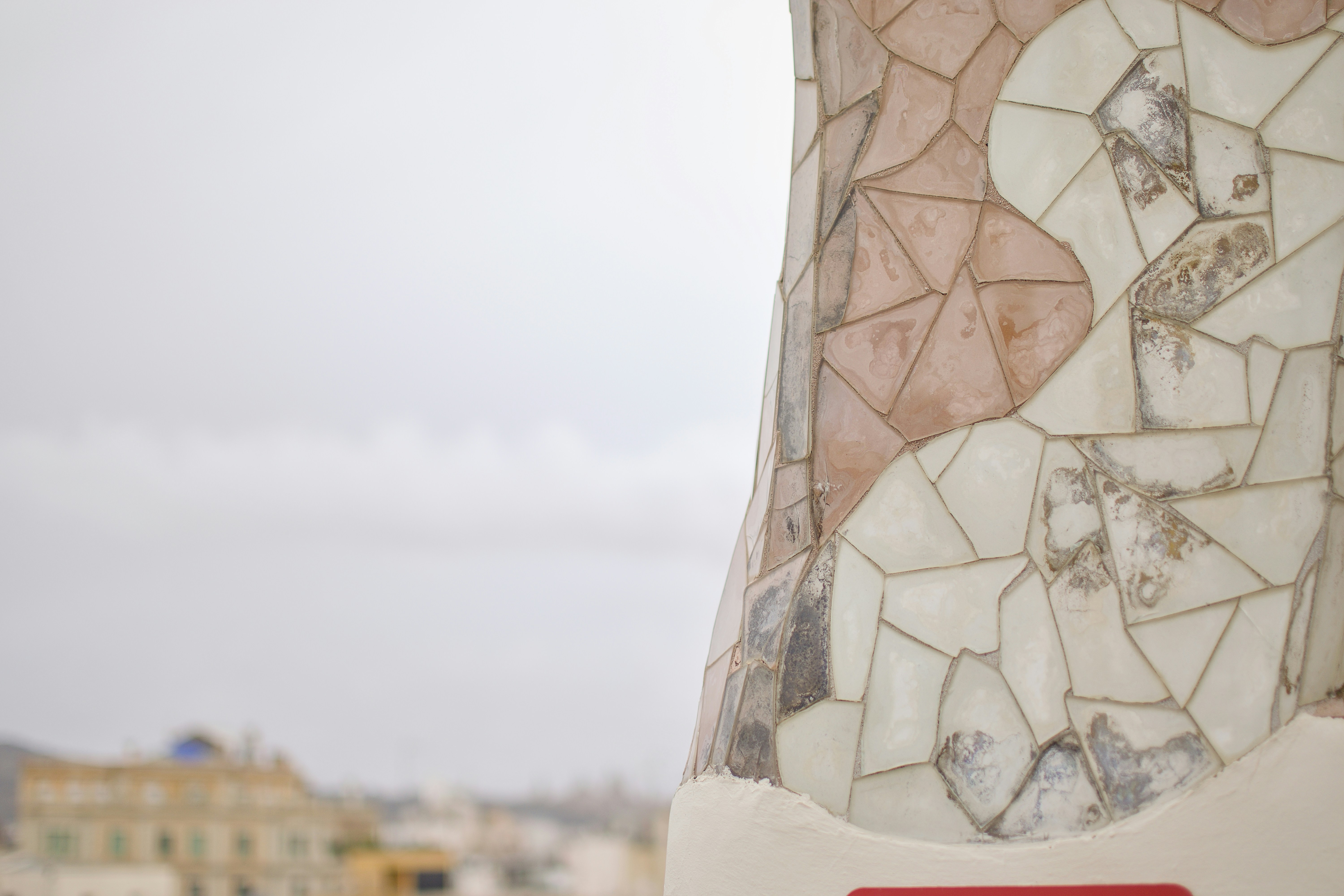 Mosaic Column Rising from a Quiet Seascape