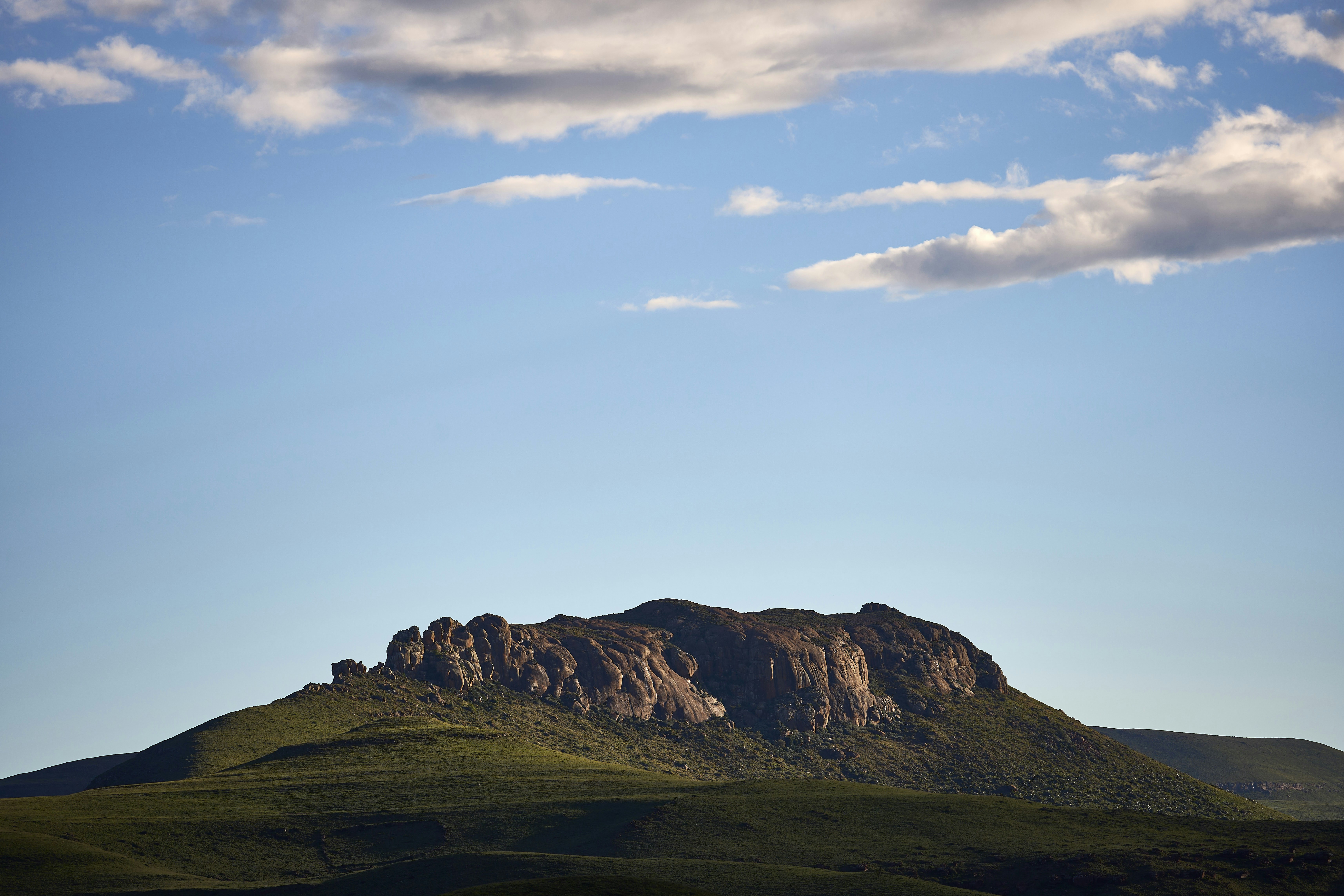 Rugged Hillline Under an Expansive Sky
