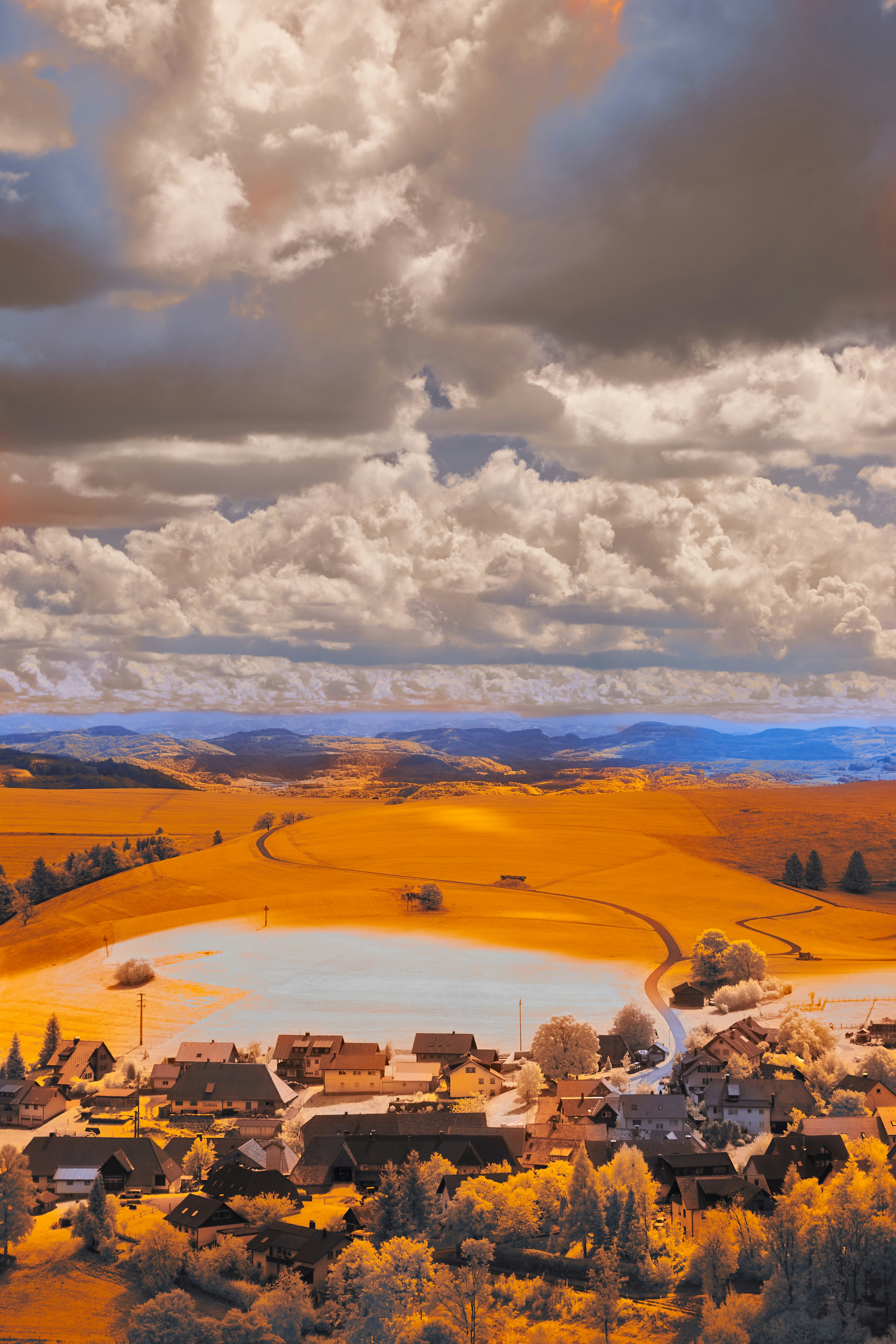 Golden Valley Under a Tapestry of Clouds