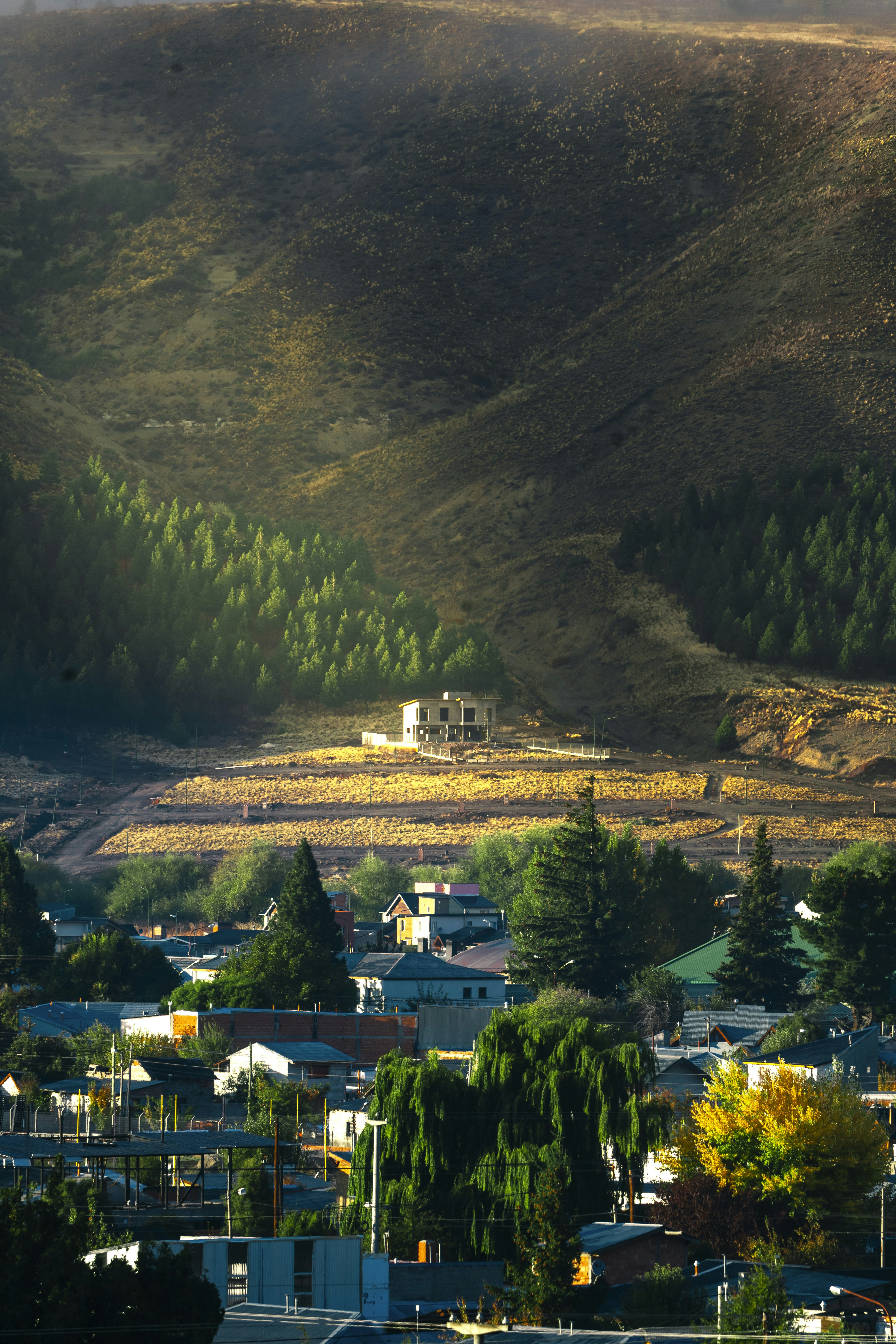 Quiet Mountain Valley: A House Among Sloping Hills