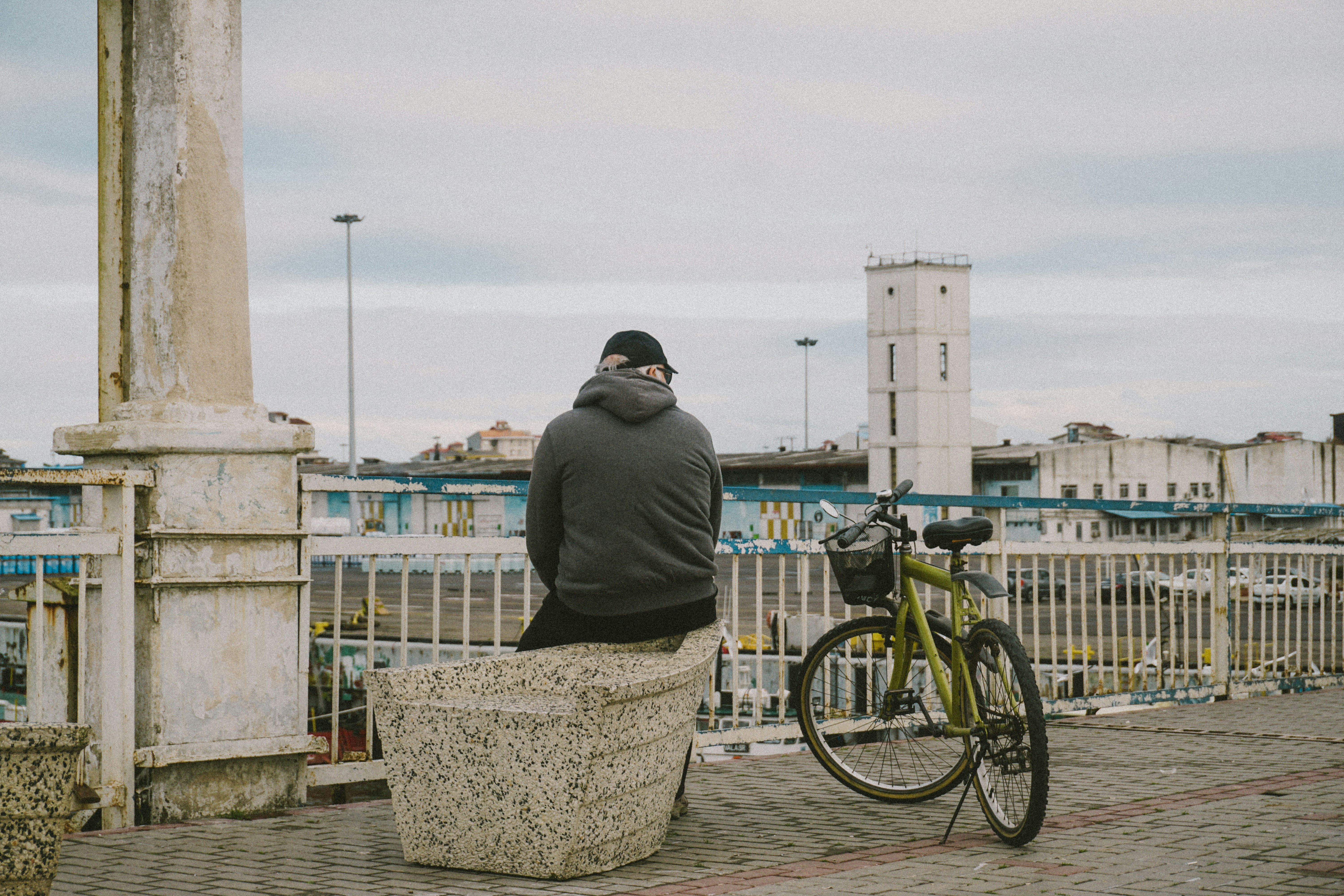 Lonely Rider on the Waterfront Bench