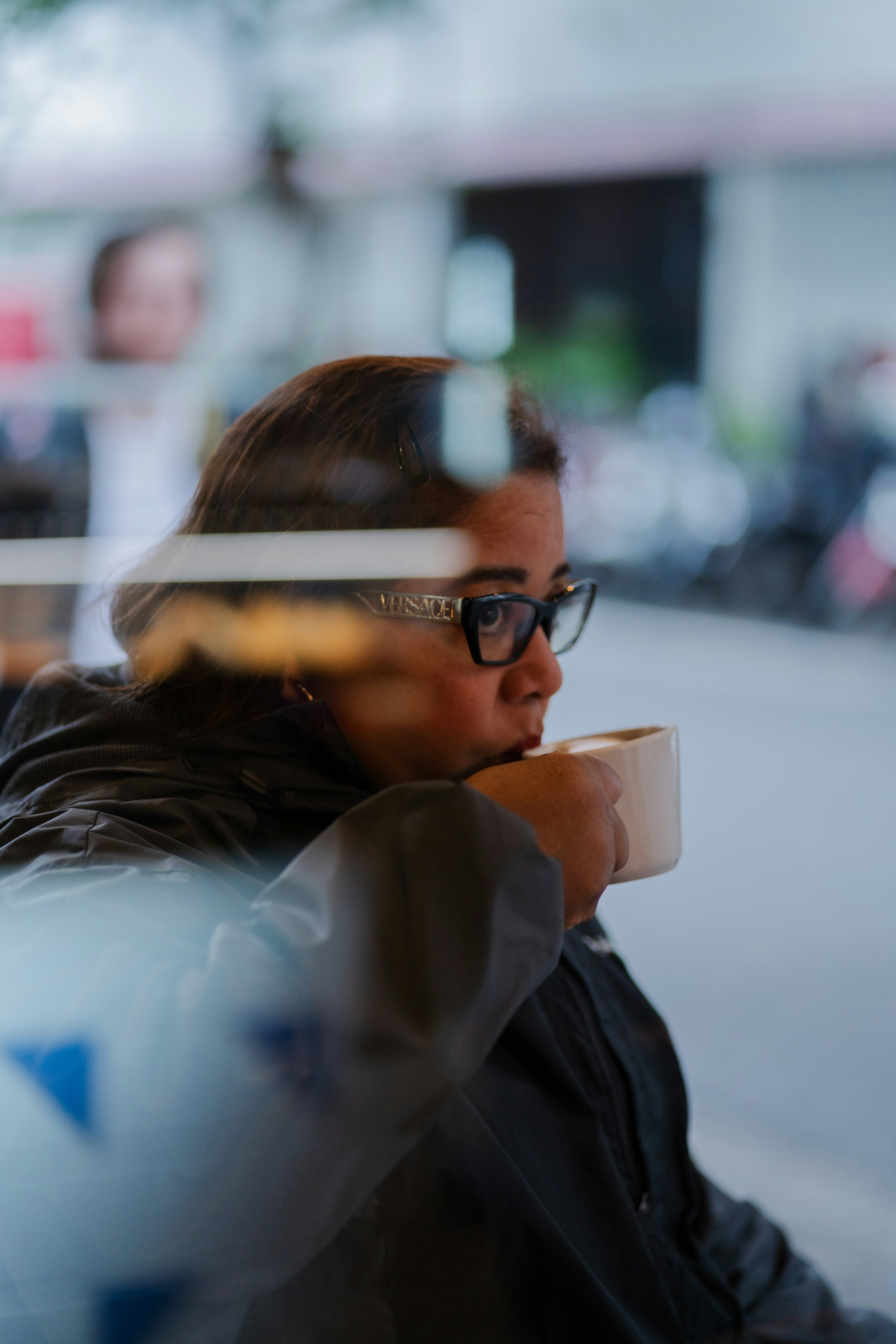 Coffee at the Window: A Quiet Moment Inside a Café