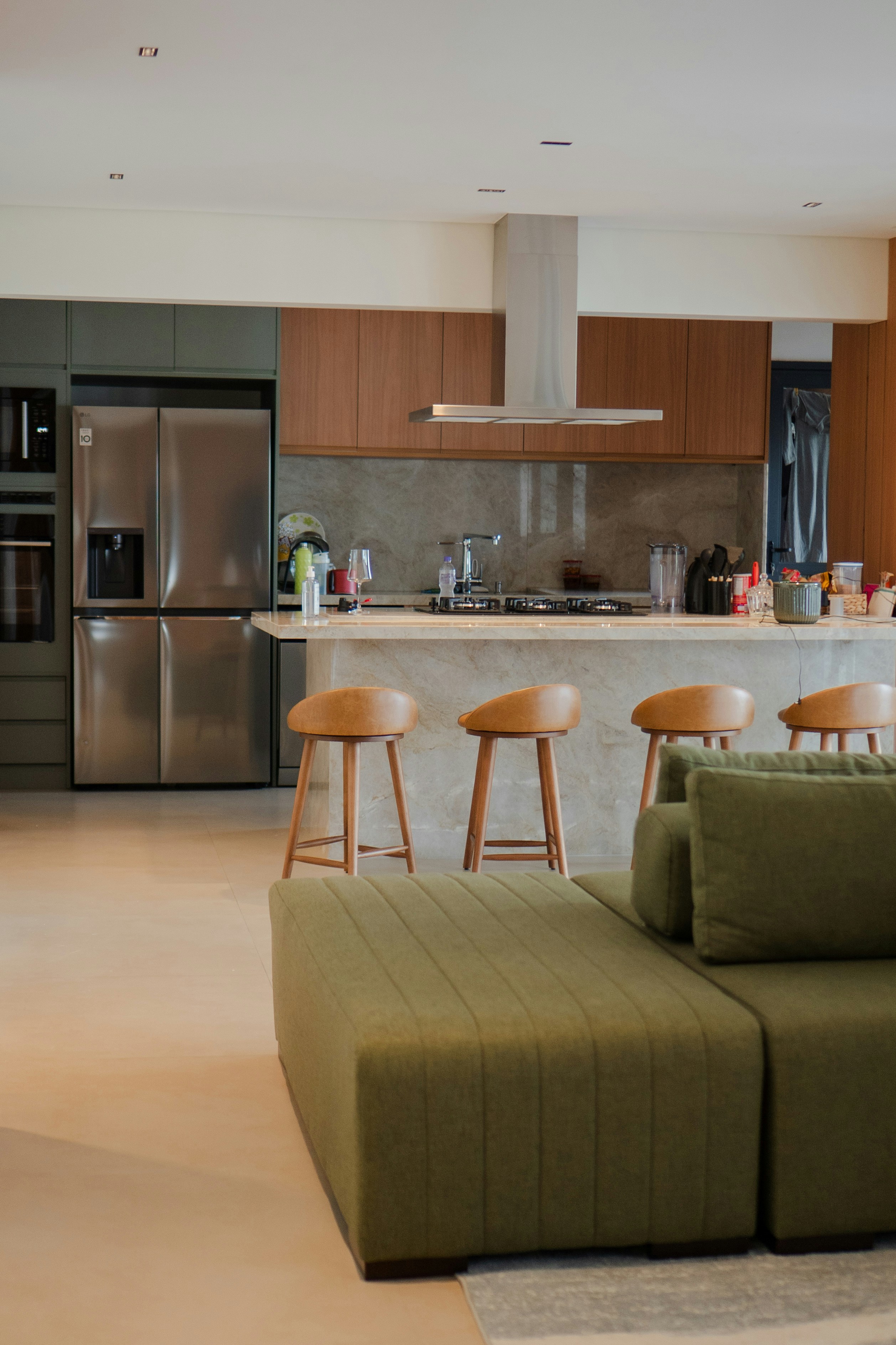 Open-Concept Kitchen Island with Bar Stools in Modern Living Space