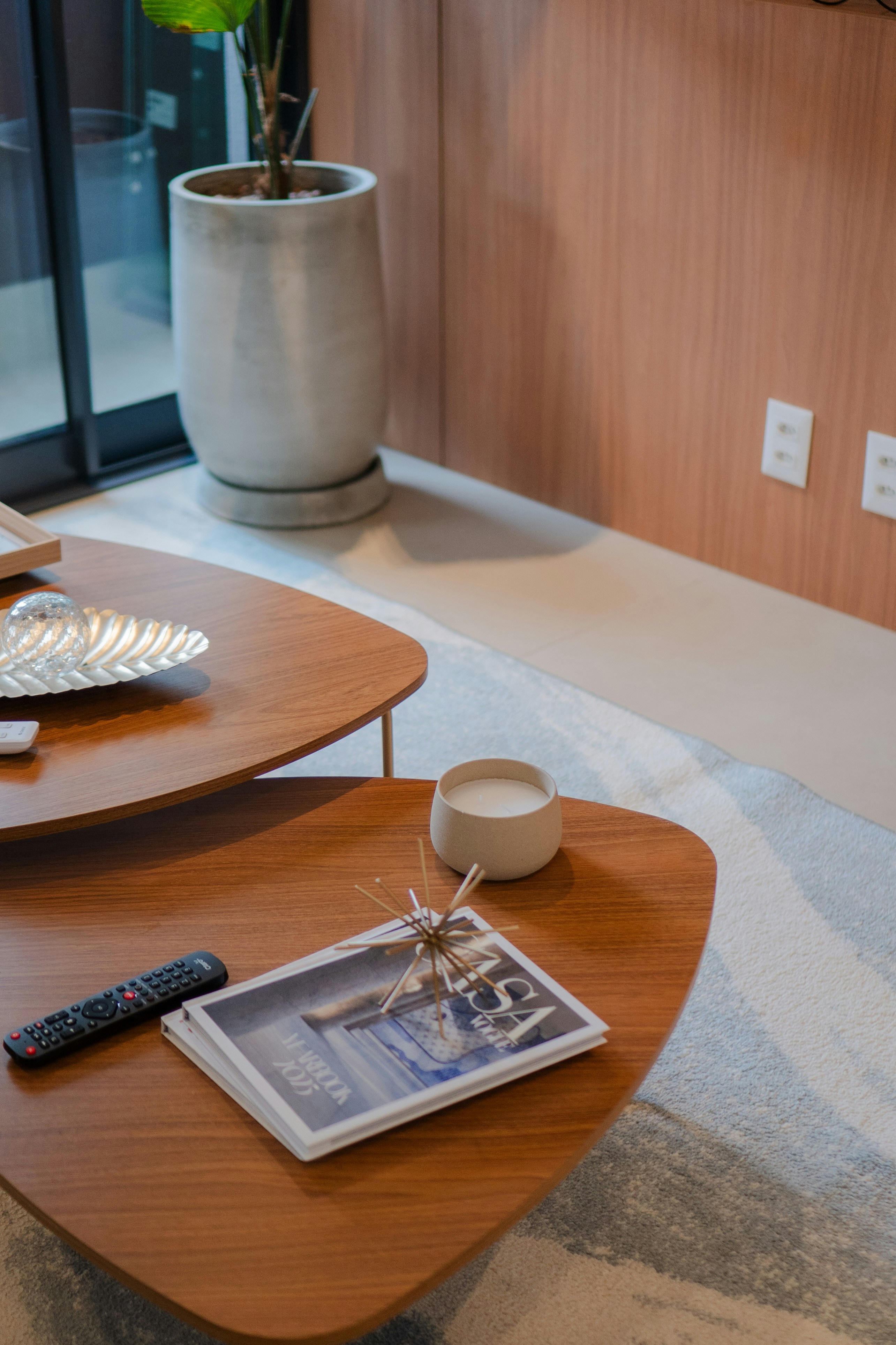 Cozy corner with walnut coffee table and magazine centerpiece