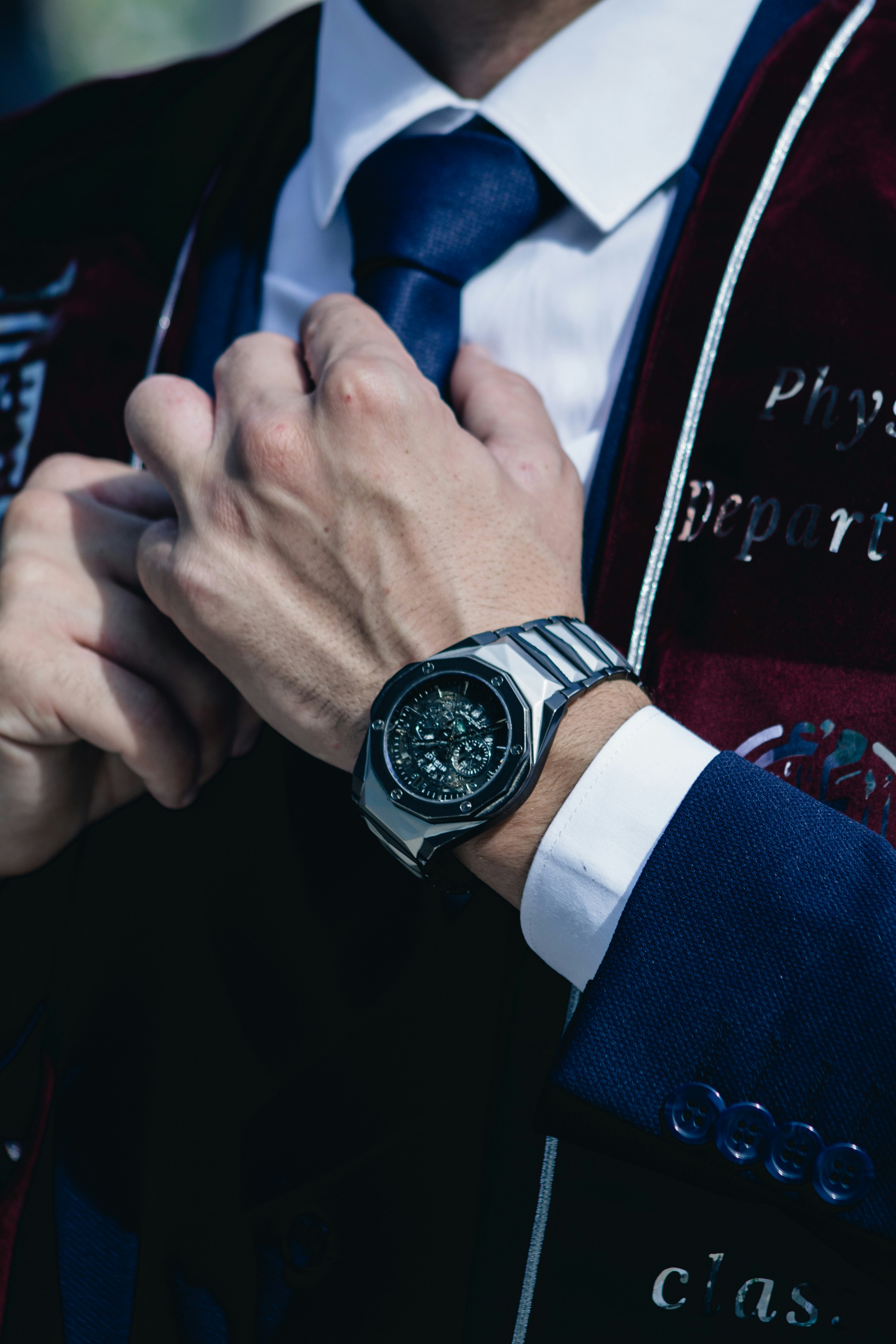 Groomed Confidence: A Close-Up of a Precision Timepiece and Hands