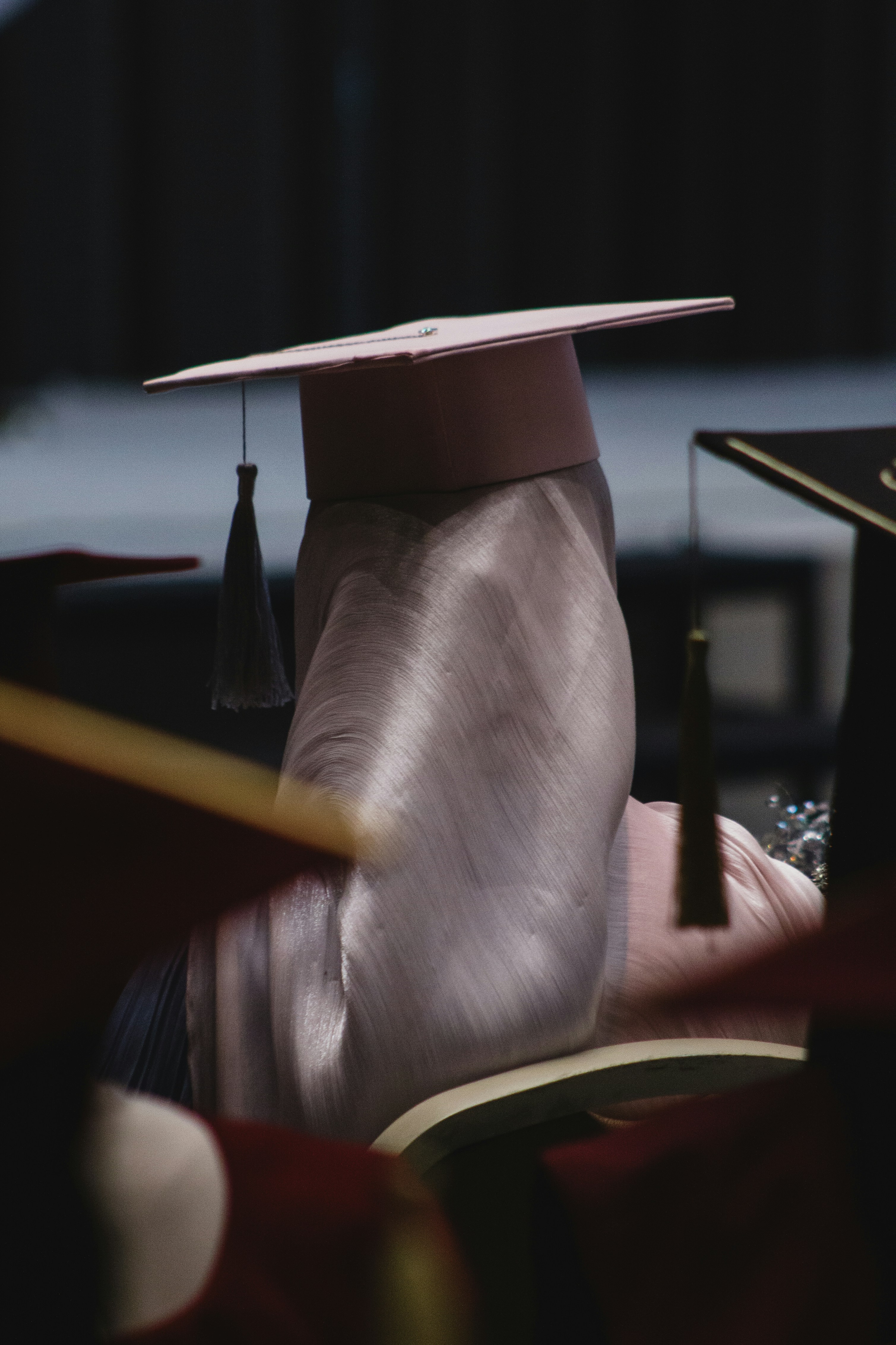 Caps and Silhouettes: A Graduation Moment in Soft Focus