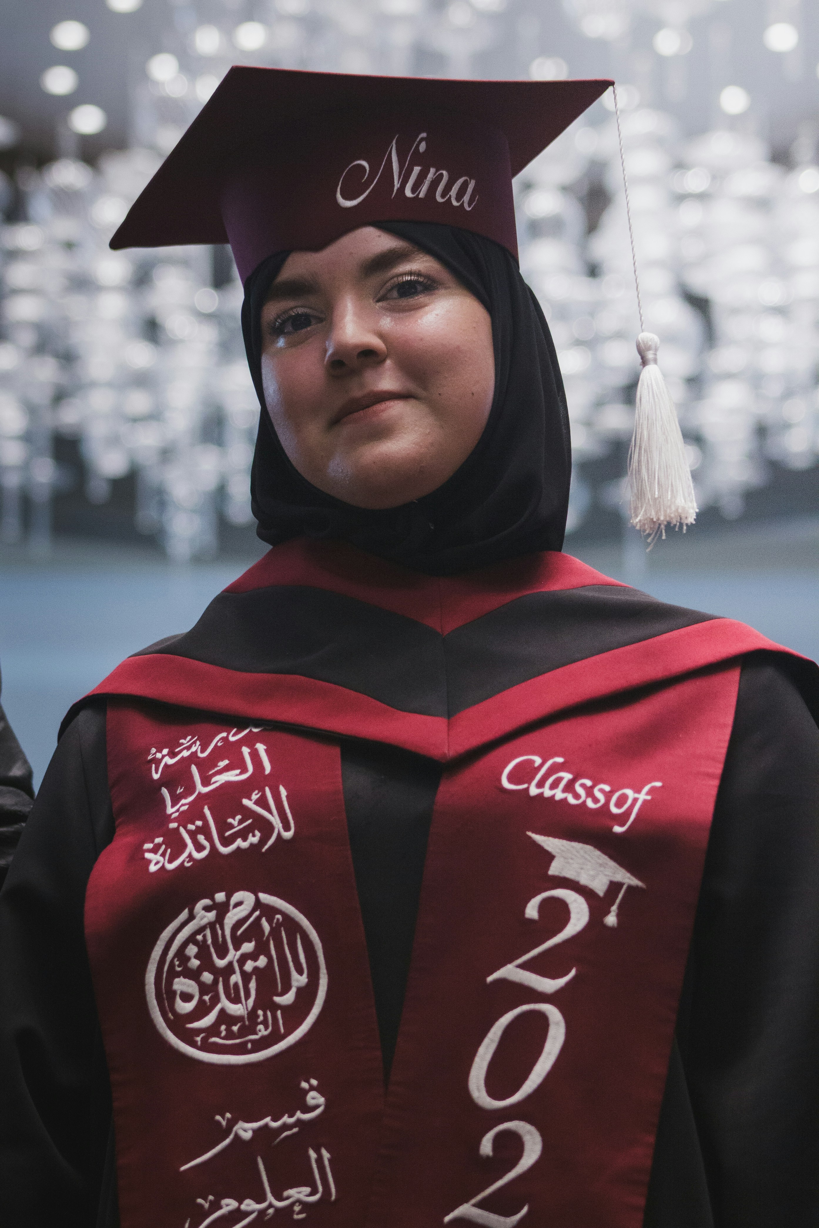 Nina in Cap and Gown: A Close-Up of Graduation Pride
