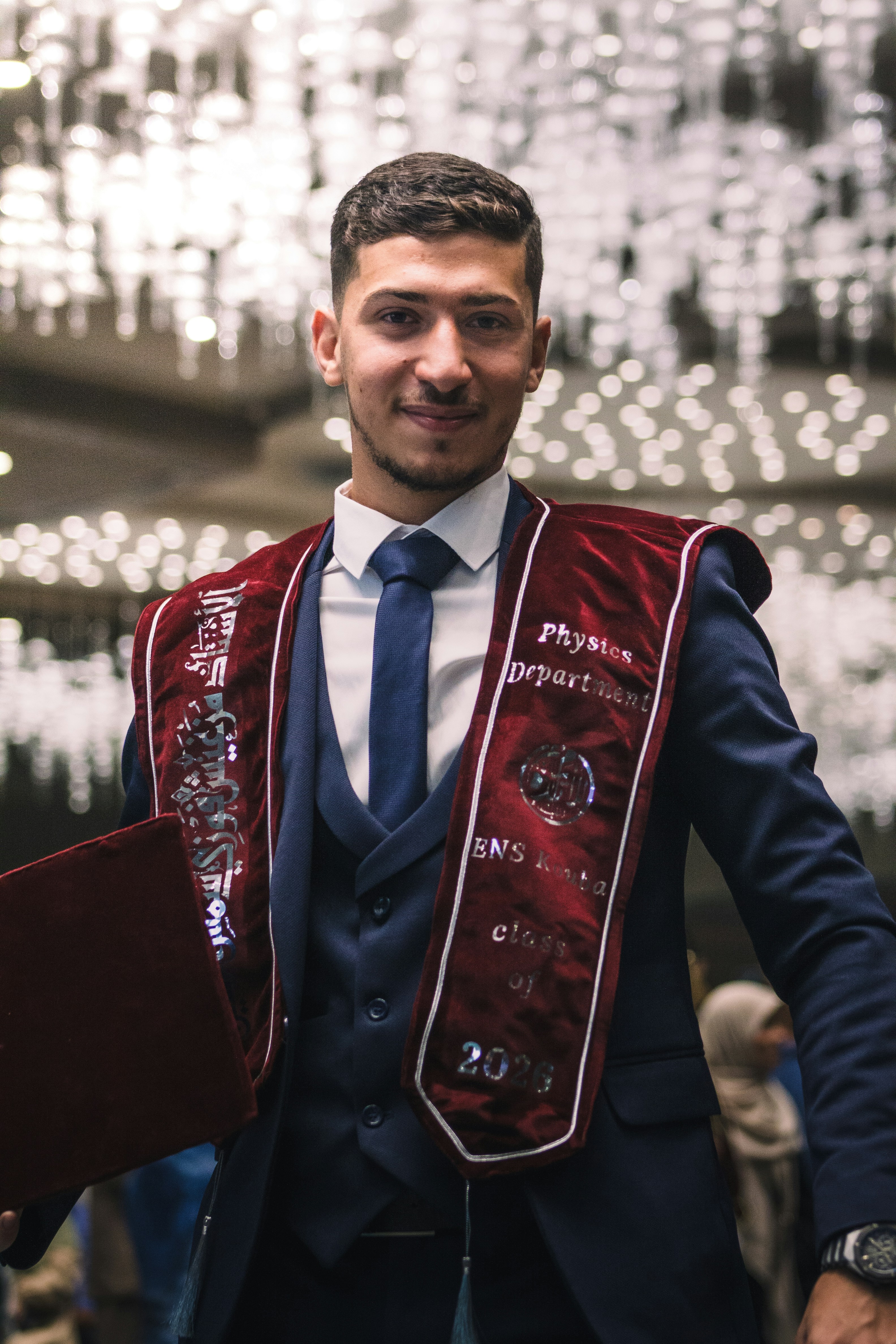Graduate in Focus: Velvet Robe Meets Neon Lights