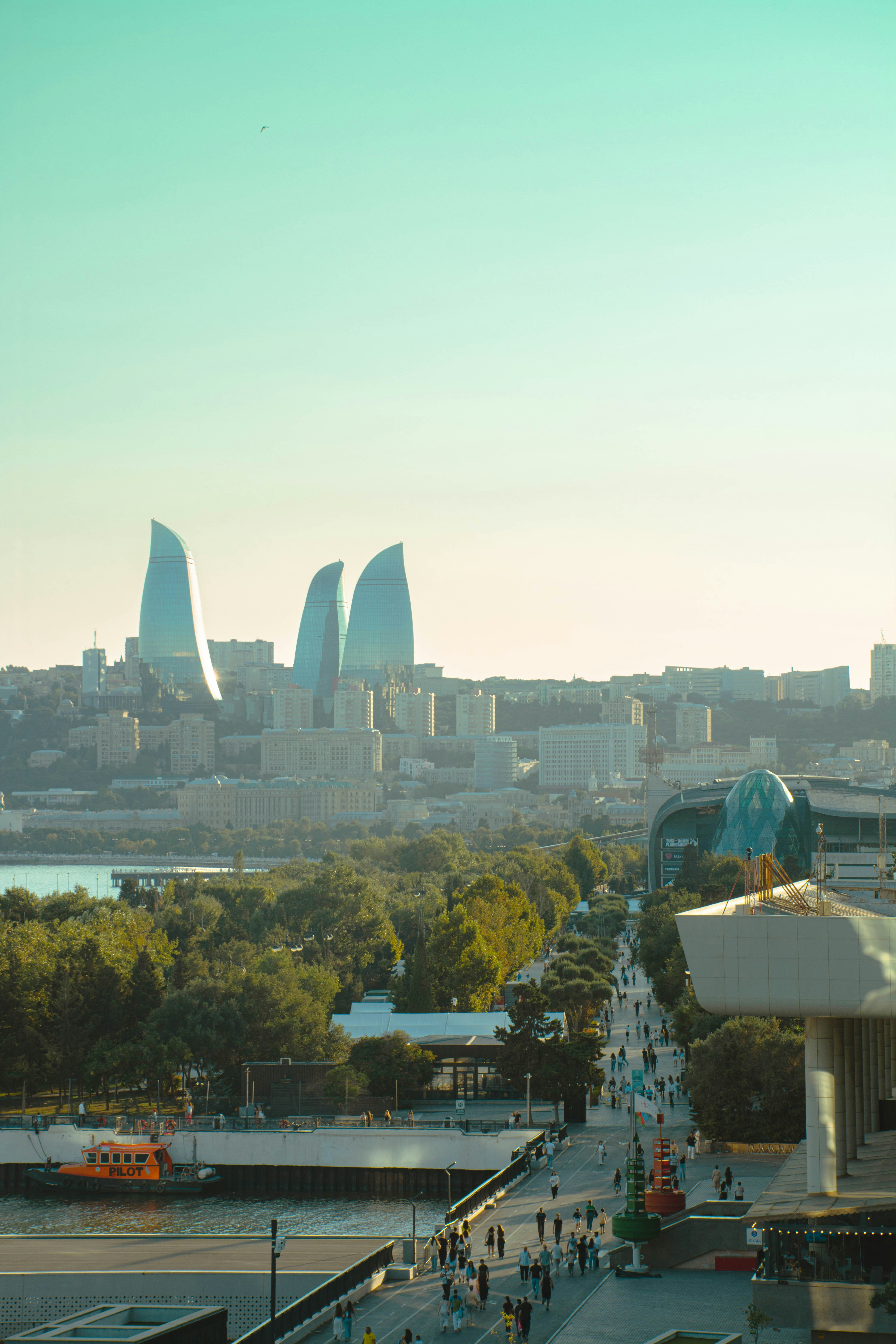 Harbor Promenade Under a Teal-Tinted Skyline