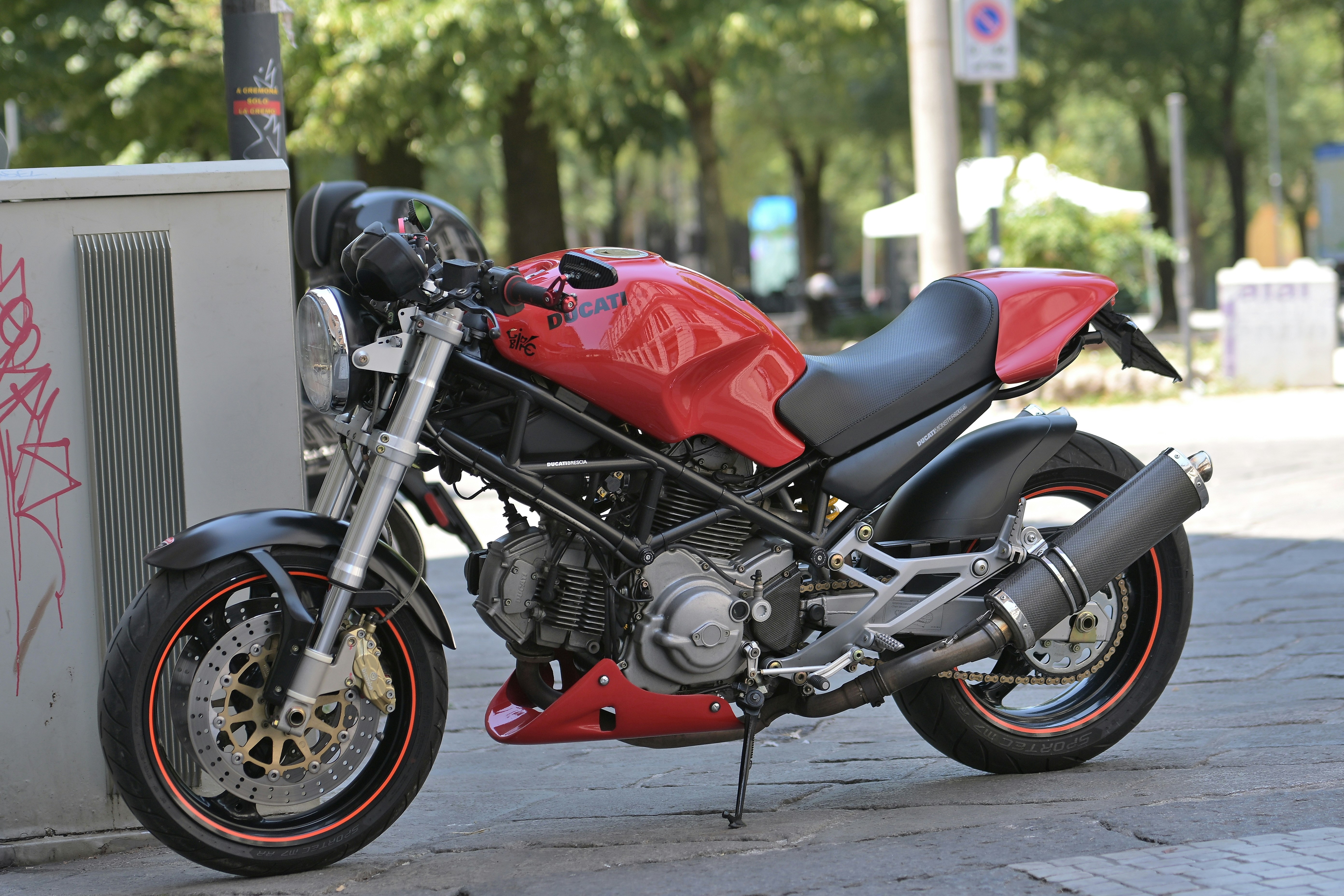 Red Dragon of the Avenue: A Matte-Black Engine Melodic in Motion