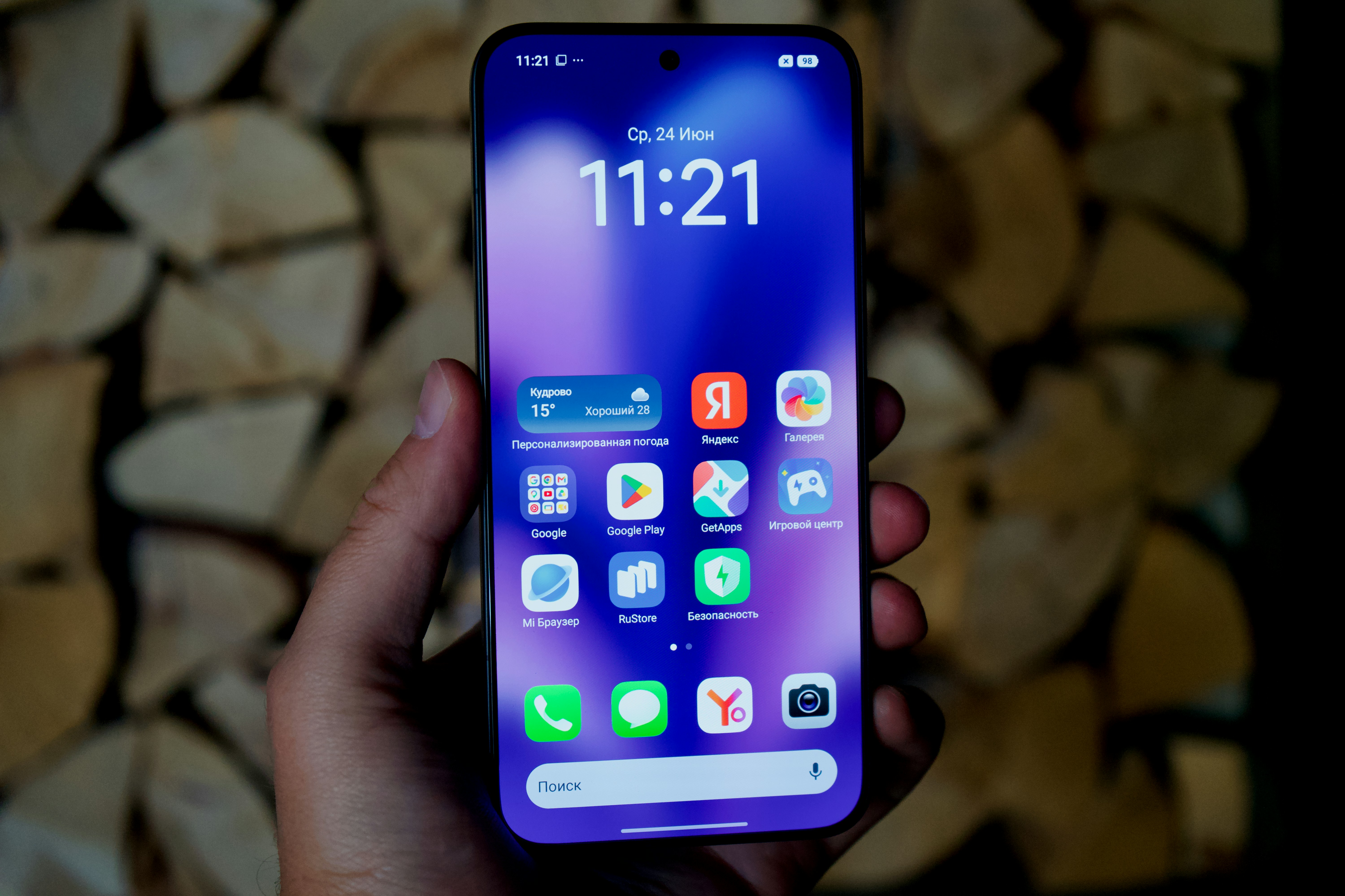 Glowing iPhone in Hand: A Portrait of Digital Focus