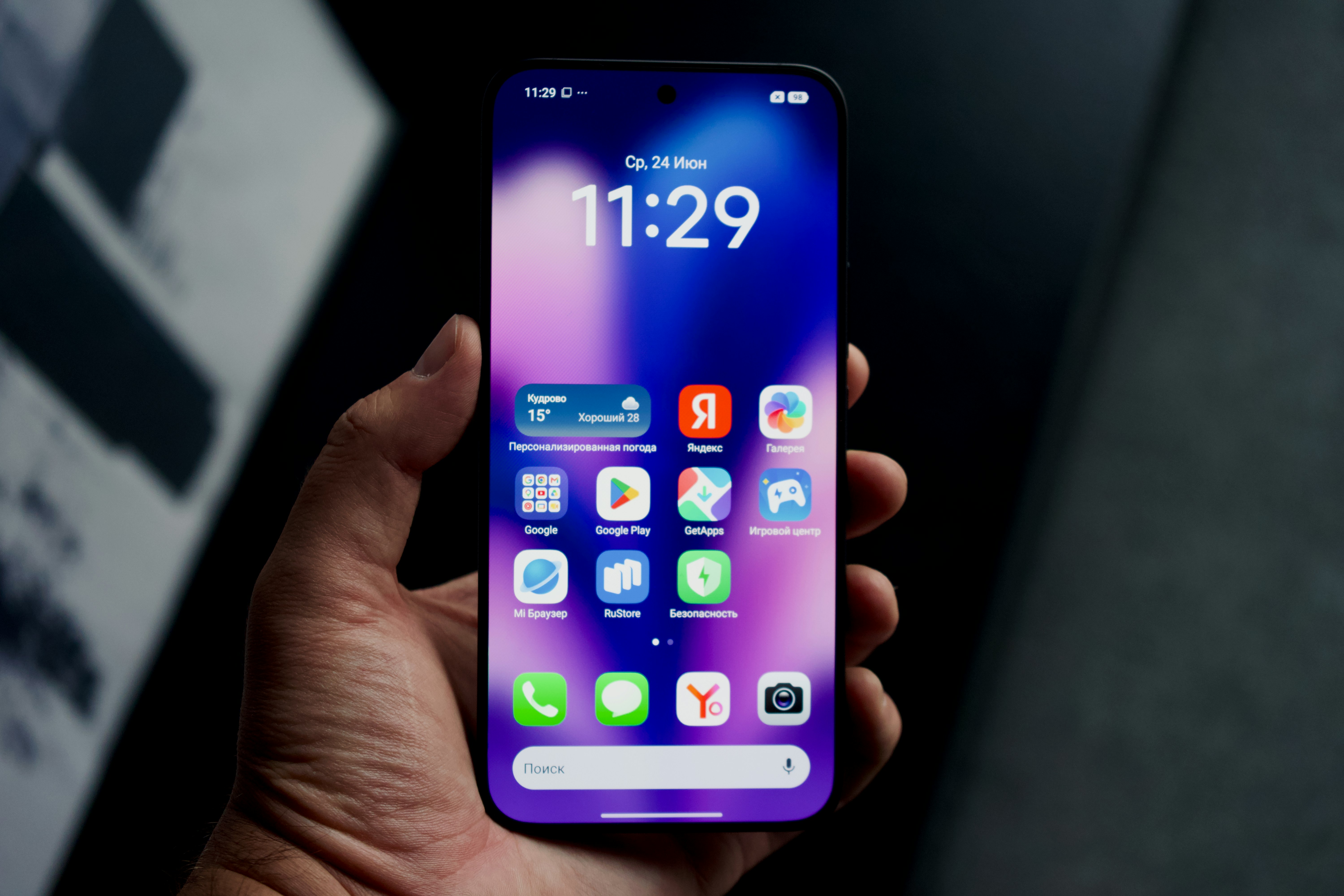 Glowing Portrait: A Hand-Clutched Smartphone with Neon UI