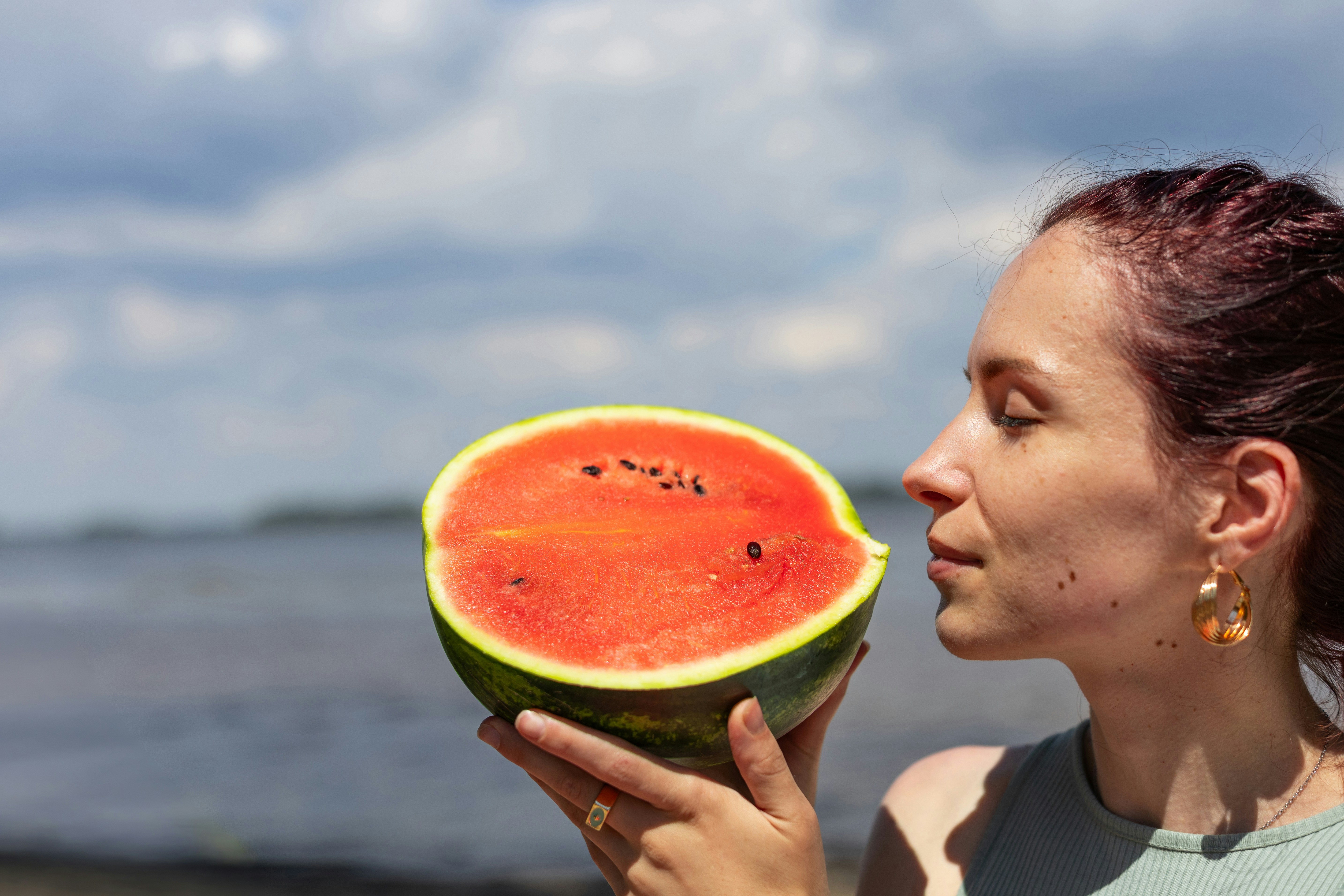 Watermelon Reverie: A Quiet Moment by the Shore