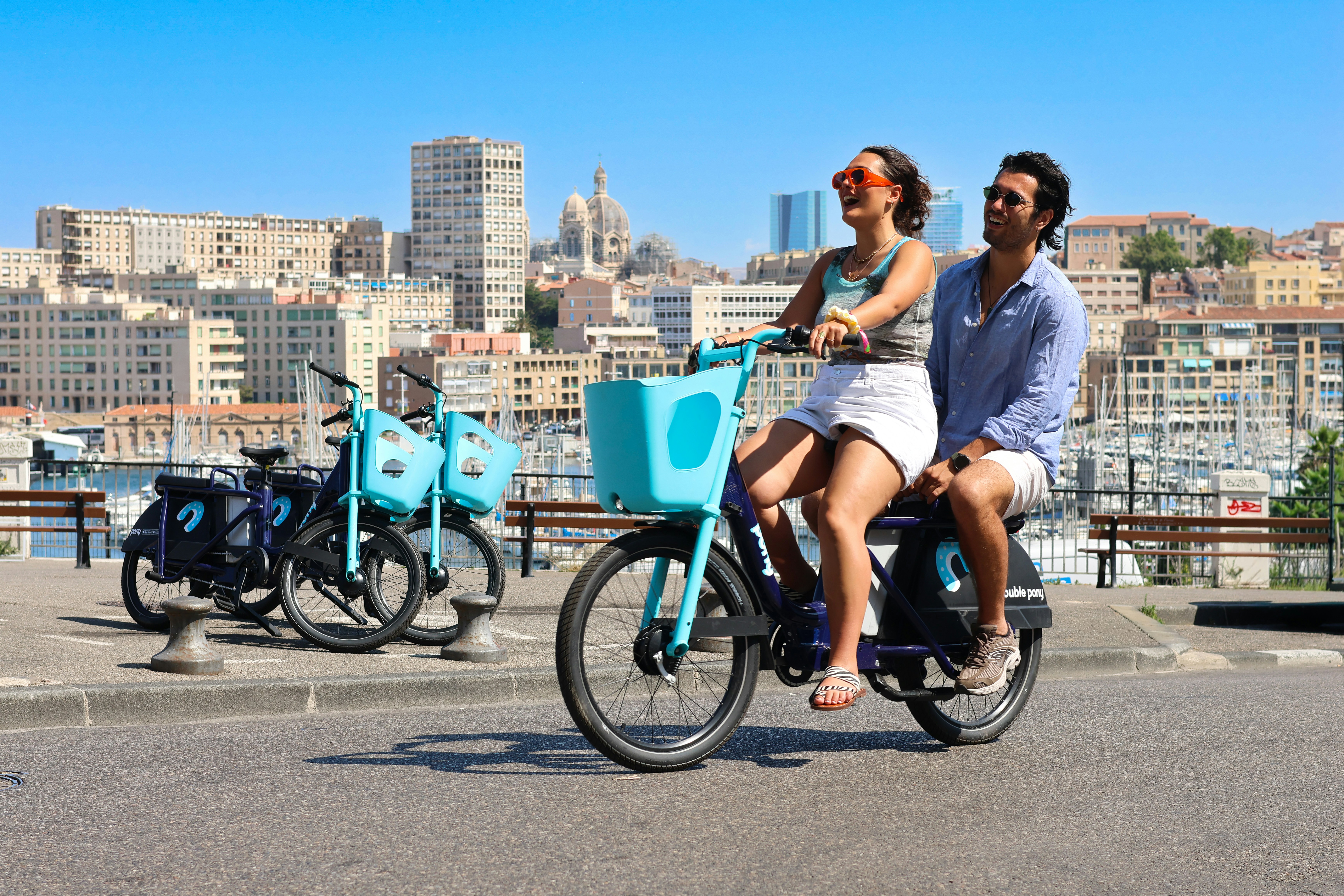 Bright Blue Tandem Ride by the Waterfront