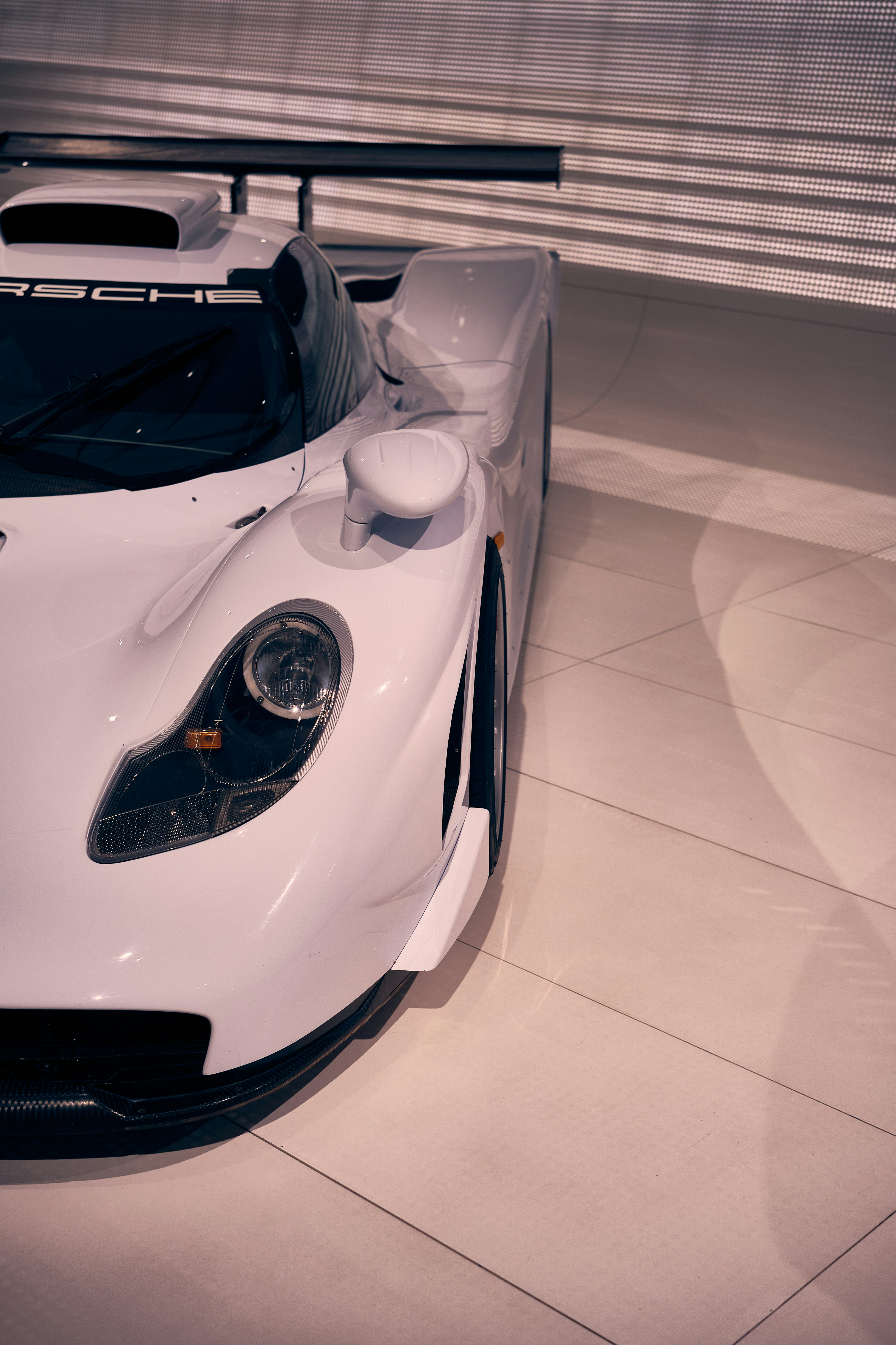 Edge of Velocity: Front Quarter of a Porsche Racecar