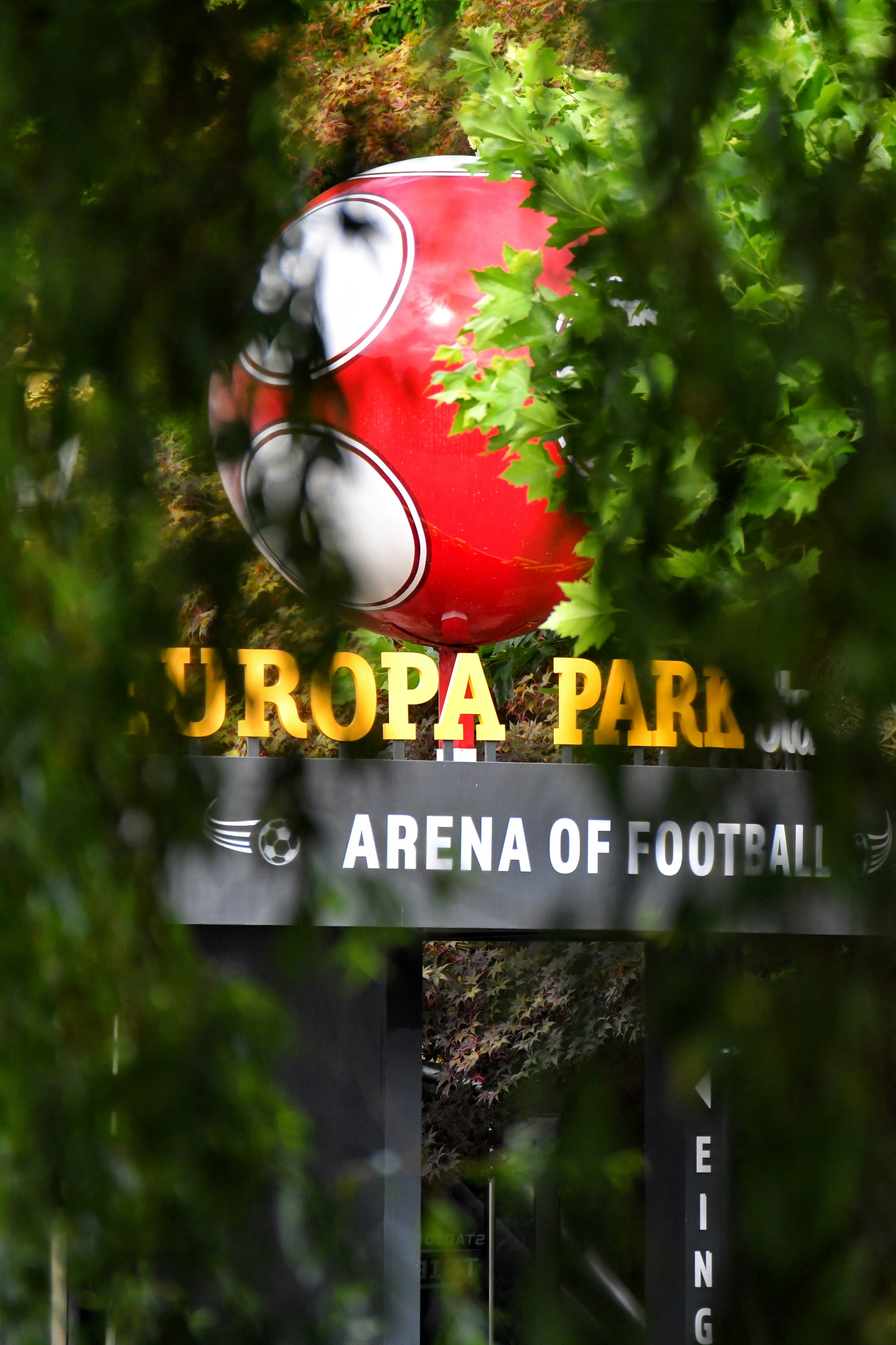 Red Ball and Golden Letters: Entrance to Europe Park Football Arena
