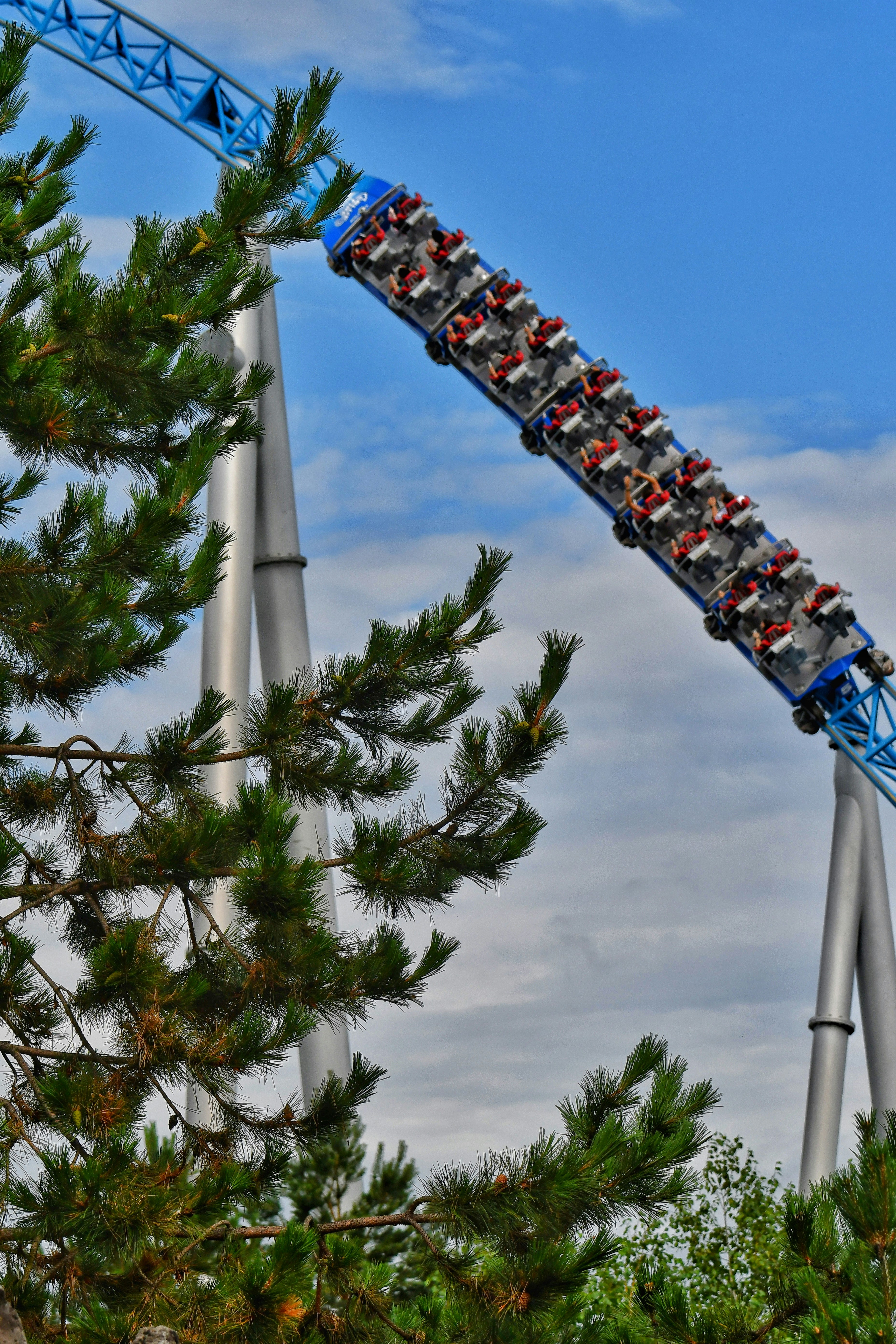 Daredevil Rails: A Rollercoaster Car Screaming Across Sky
