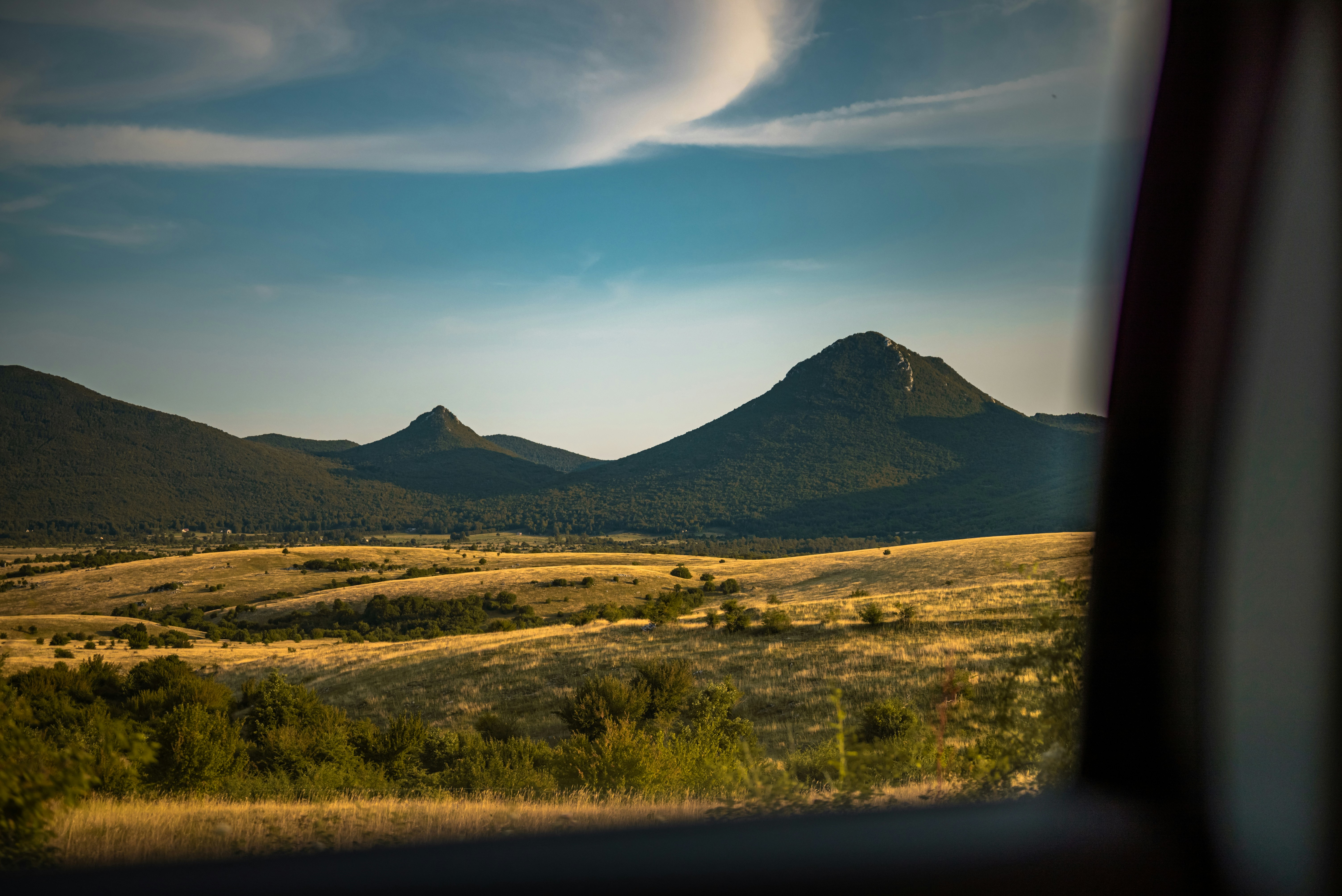 Lone Peaks Framed by an Open Window