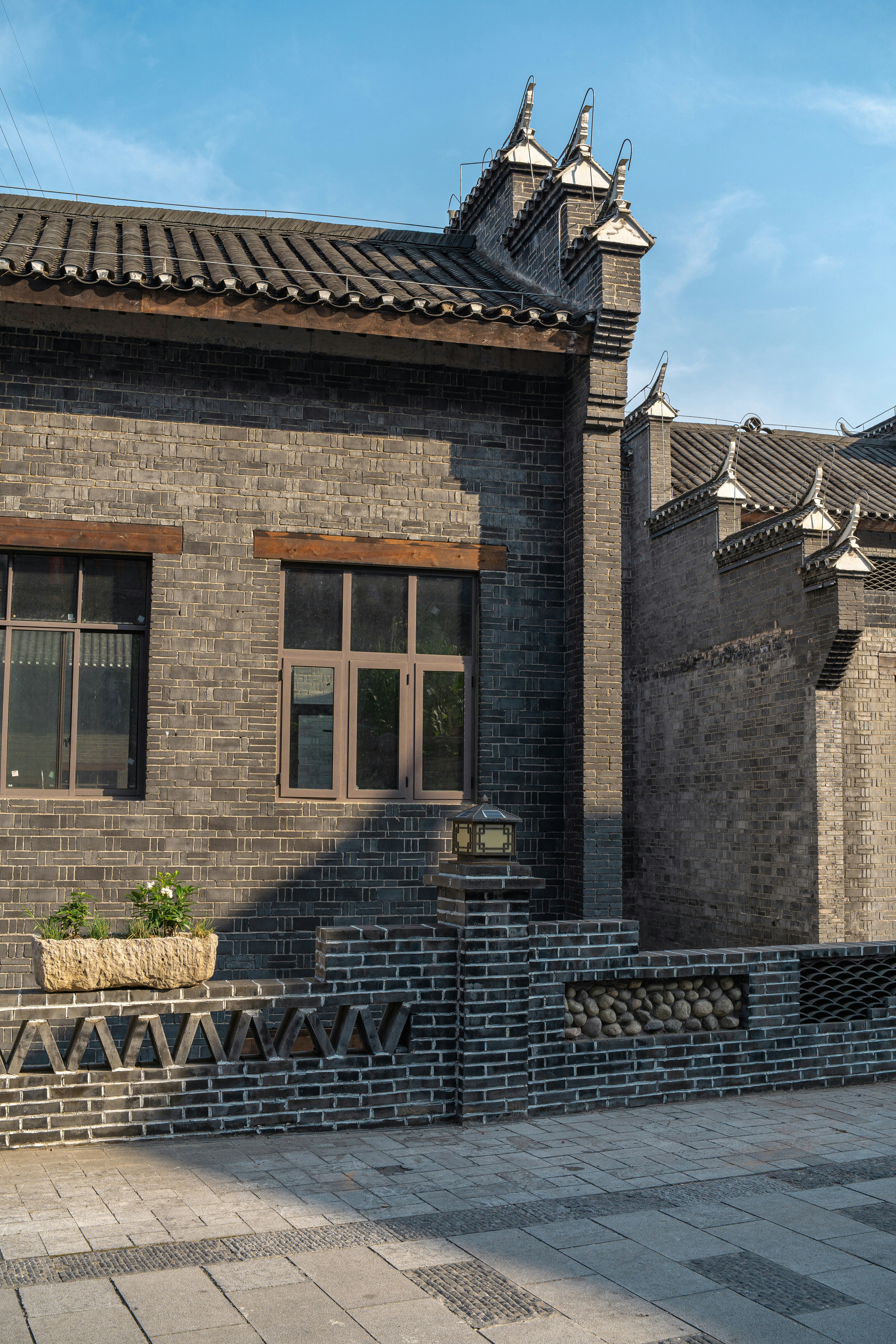 Brickwork and Ridge Lines: A Quiet Corner of a Historic Courtyard