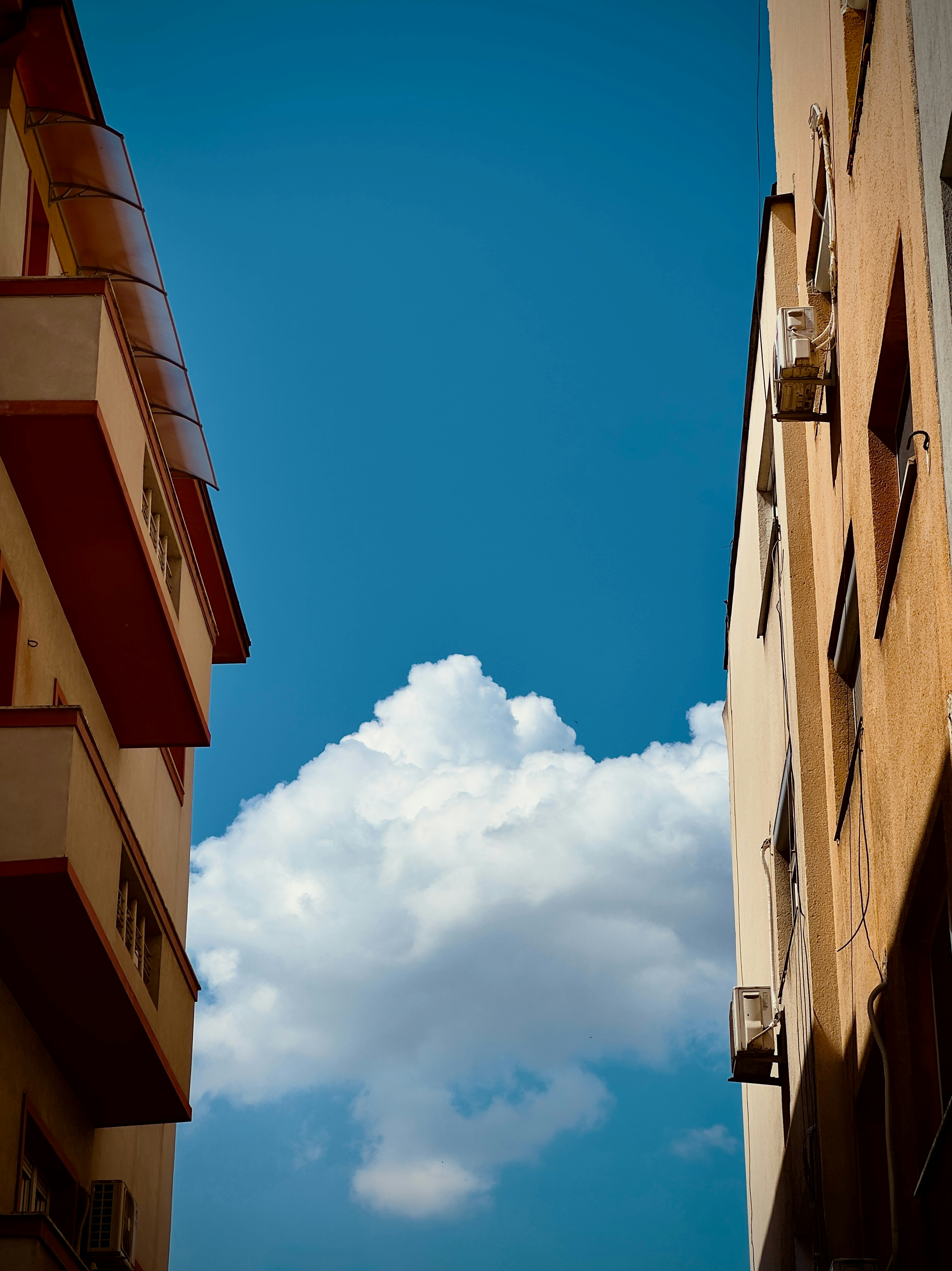 Between Skies and Facades
