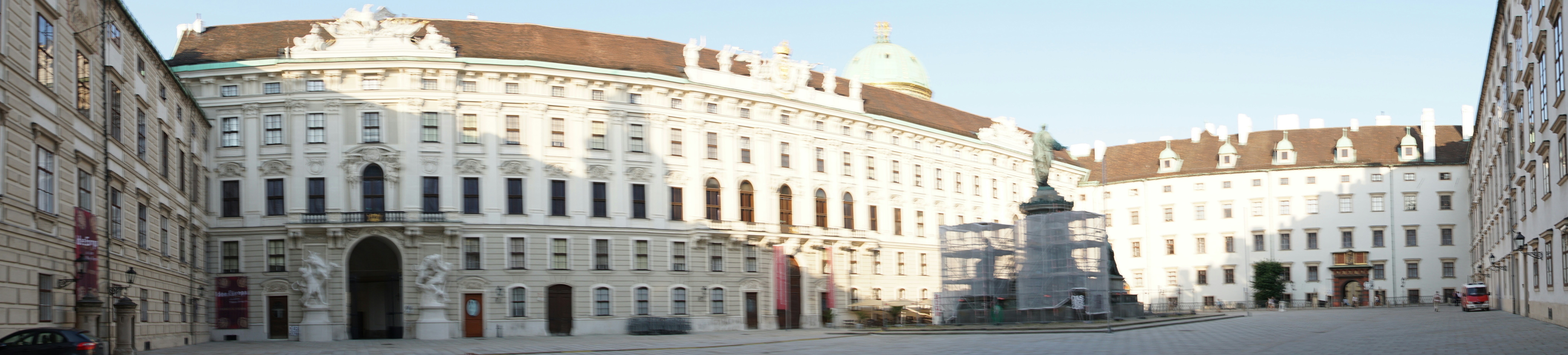 Sunlit Baroque Facades Around a Central Square