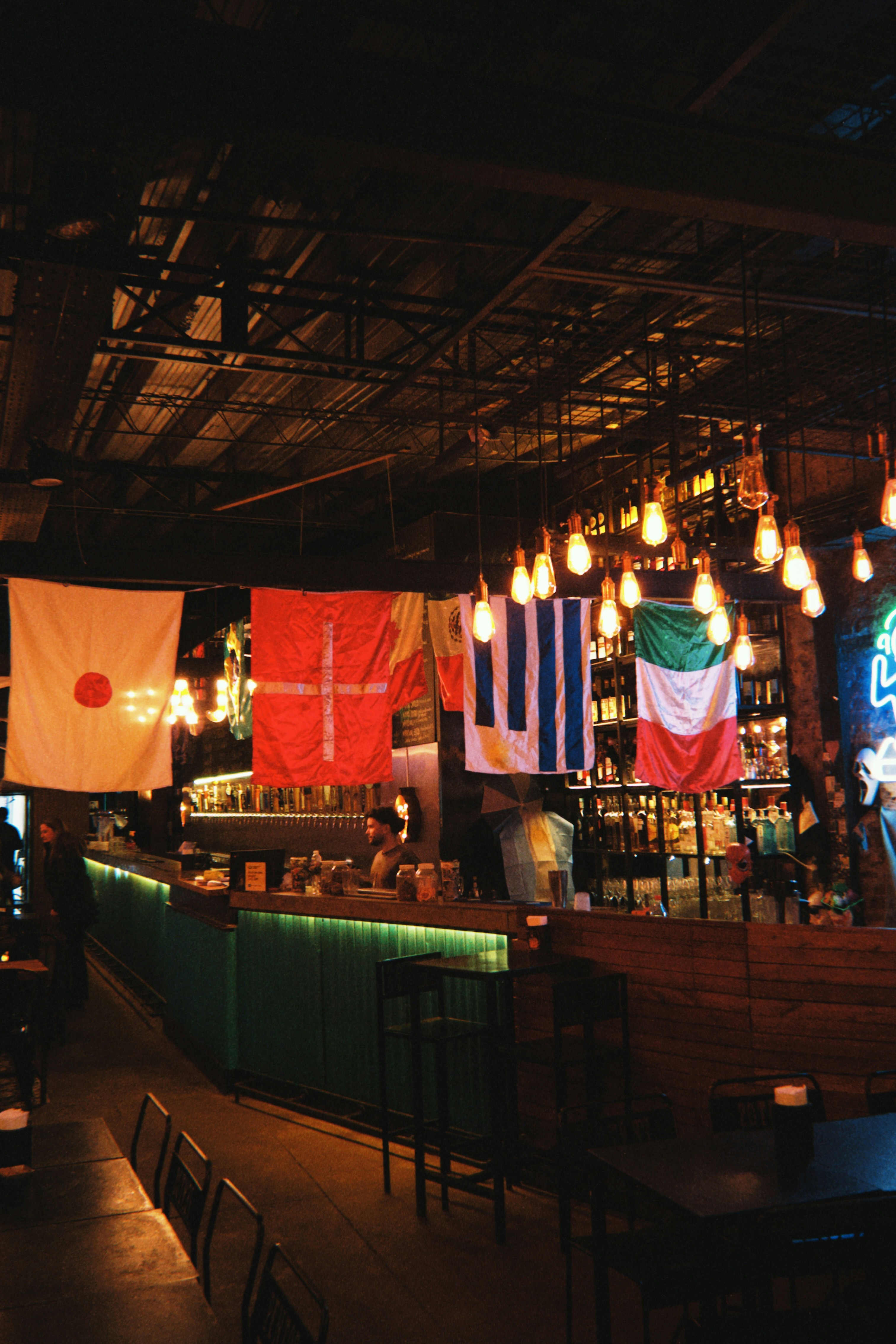 Flag-lined Bar Nook under Warm Edison Glow