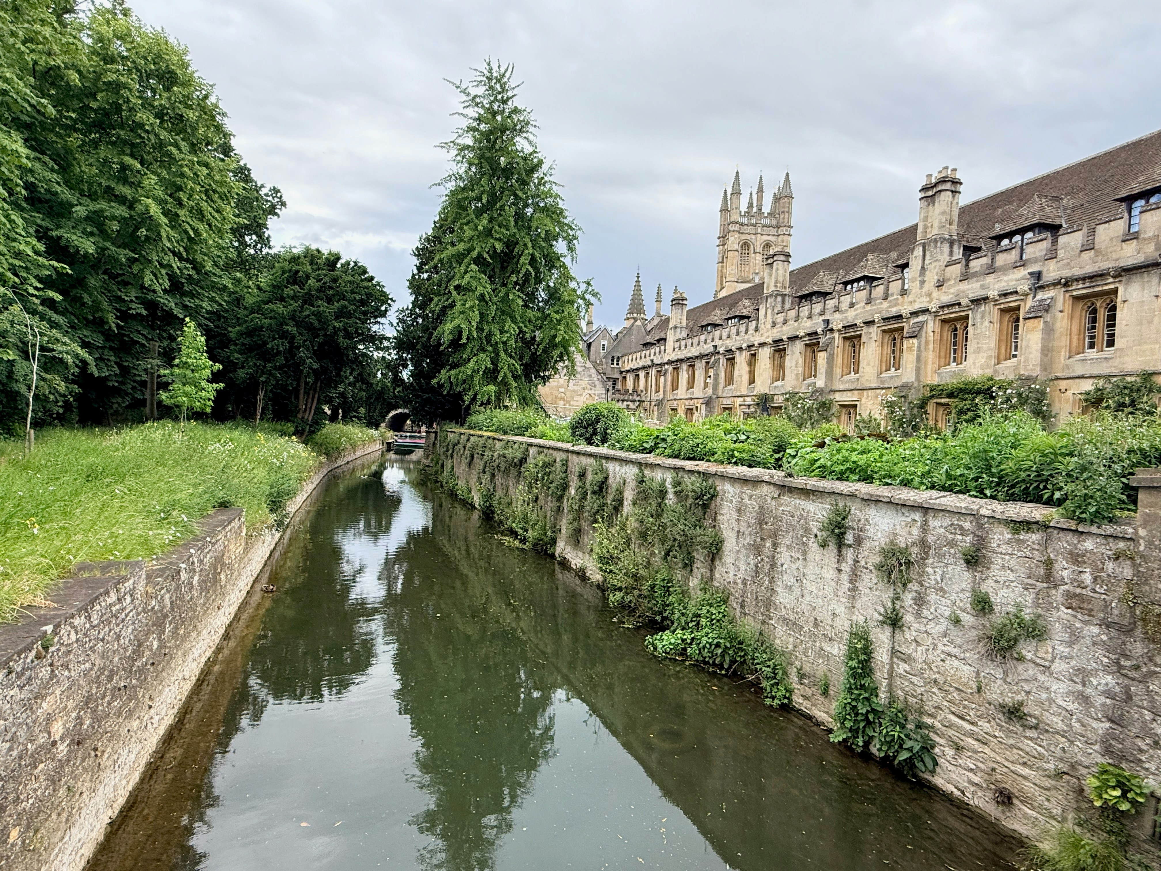 Canal and Abbey Arc: Stone Walls, Reflections, and a Dormant Waterway