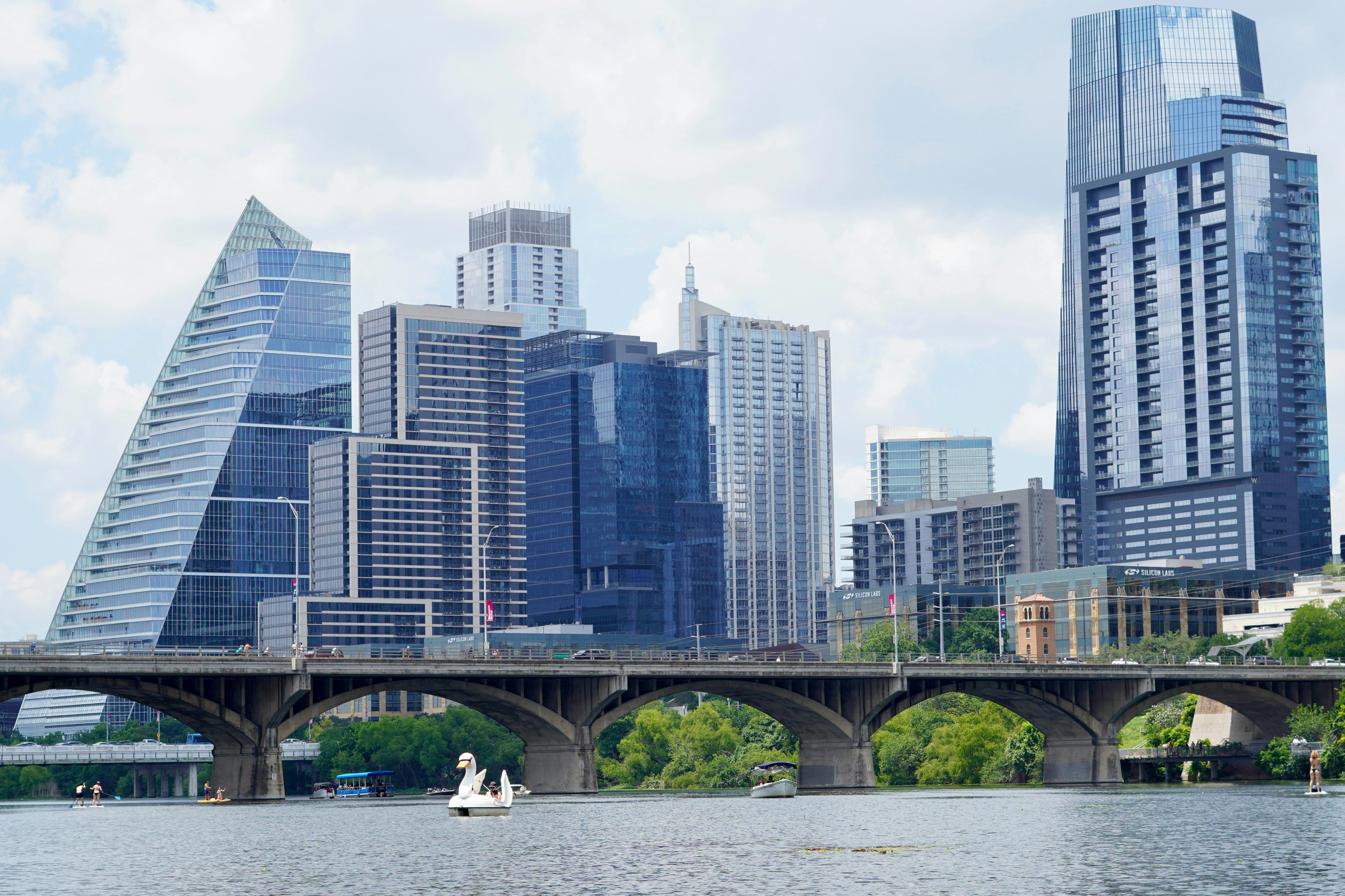 Riverfront Skyline Arches: A Bridge-Framed Cityscape