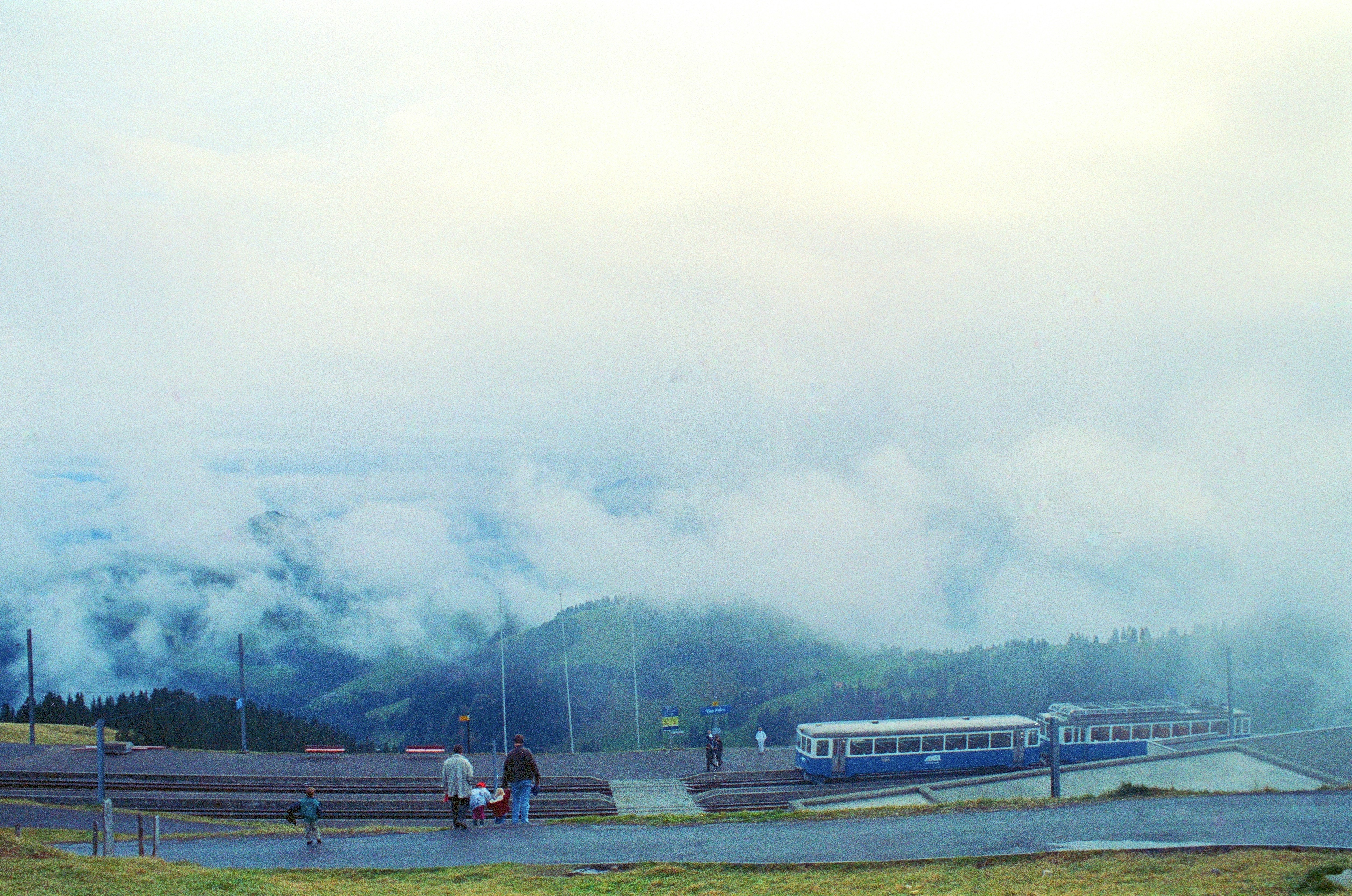 Mist over the valley: a quiet railway scene at dawn
