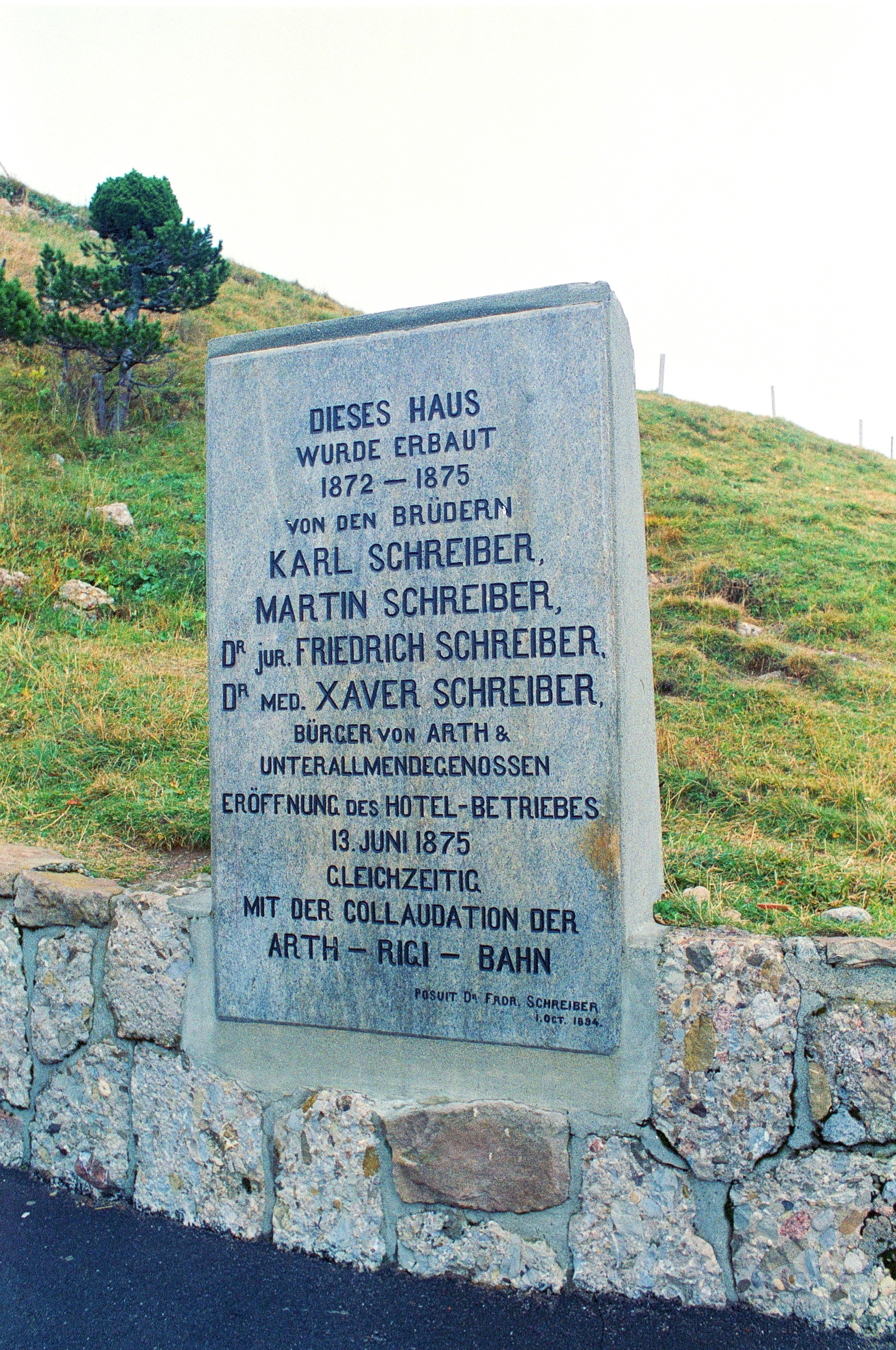 Stone Memorial on a Hill: Inscribed History Rising from the Ground