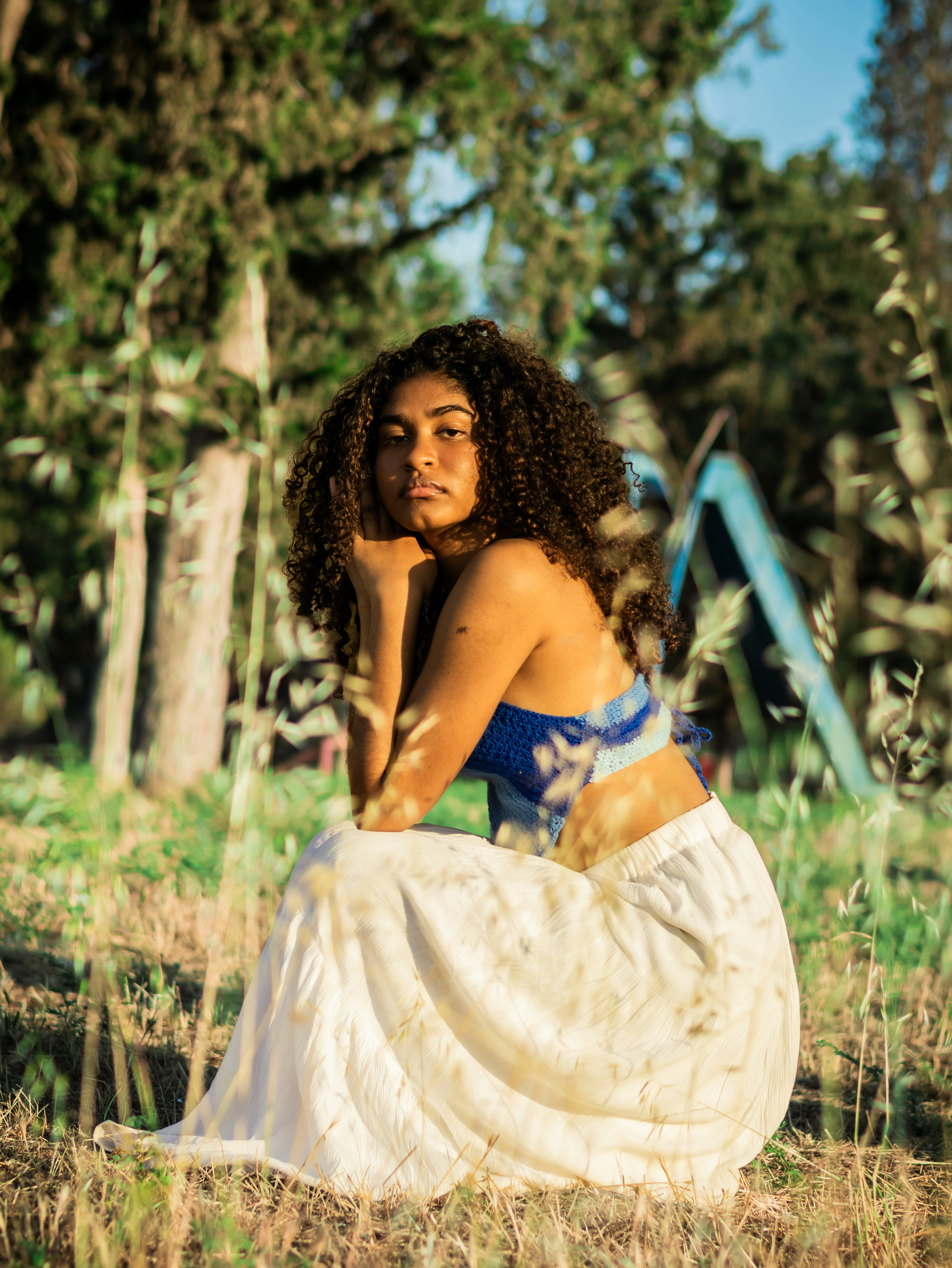 Earthy Stillness: Portrait in a Sunlit Clearing