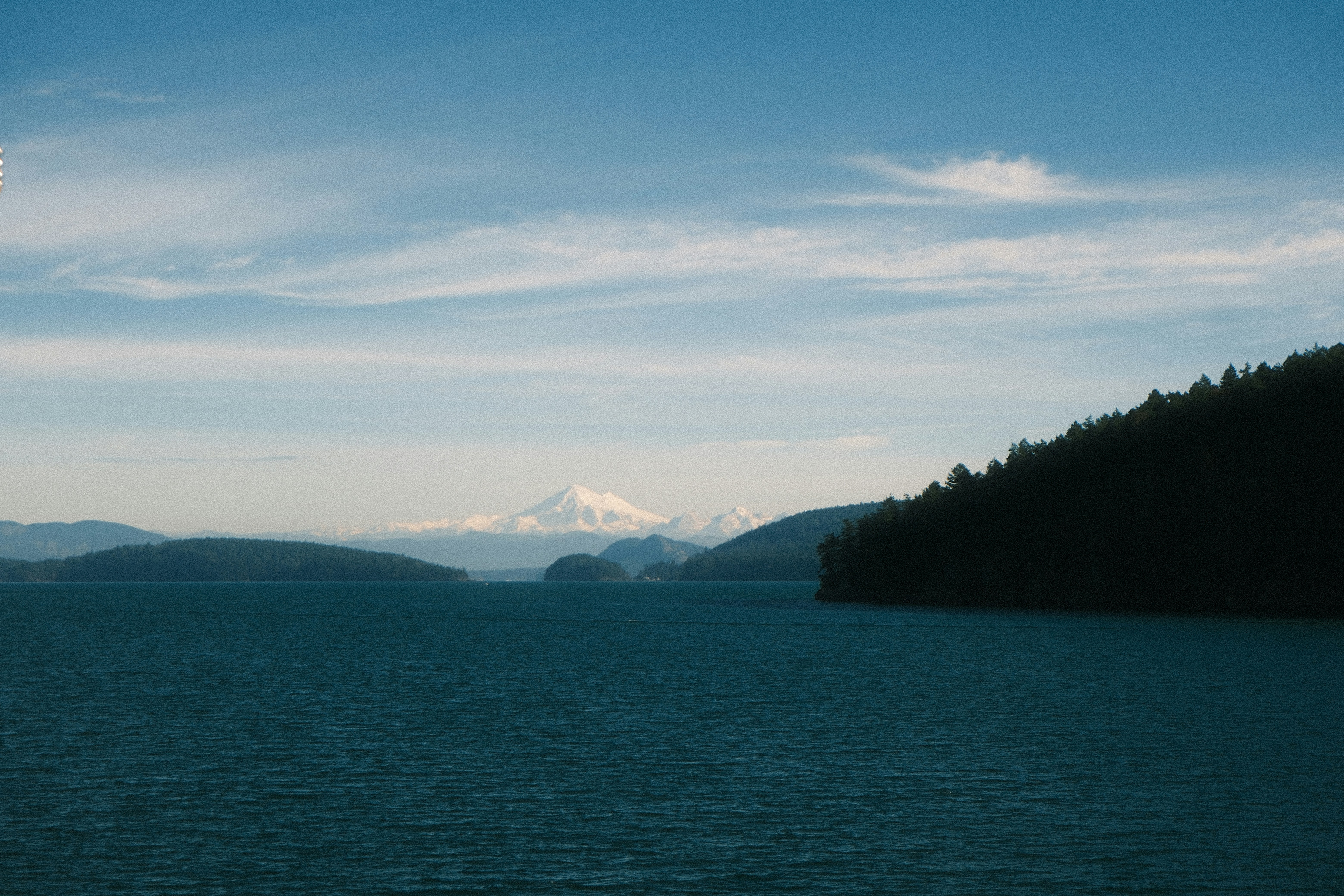 Distant Peak Beyond calm blue waters