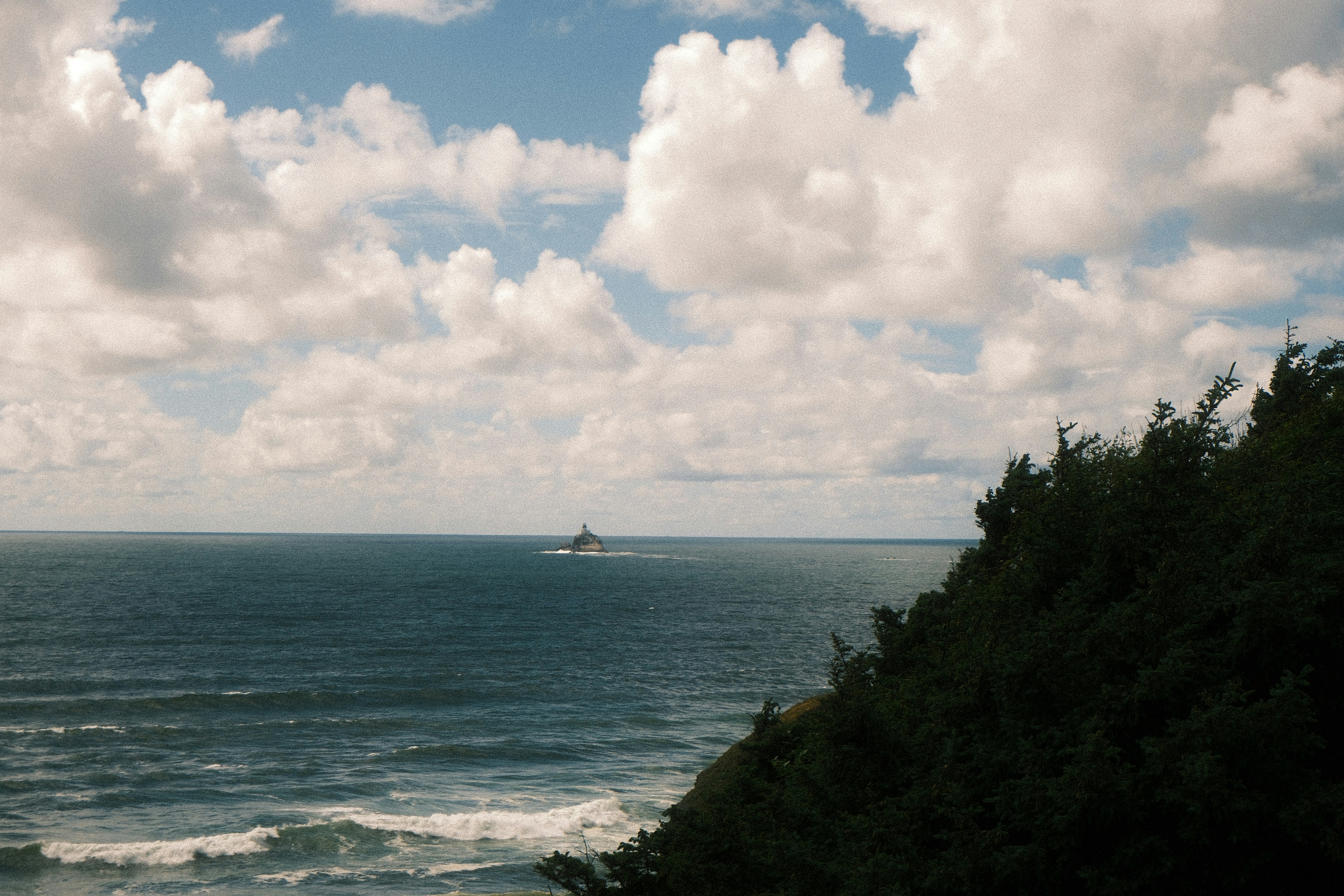 A Lone Rock Island amid the Pacific Crest