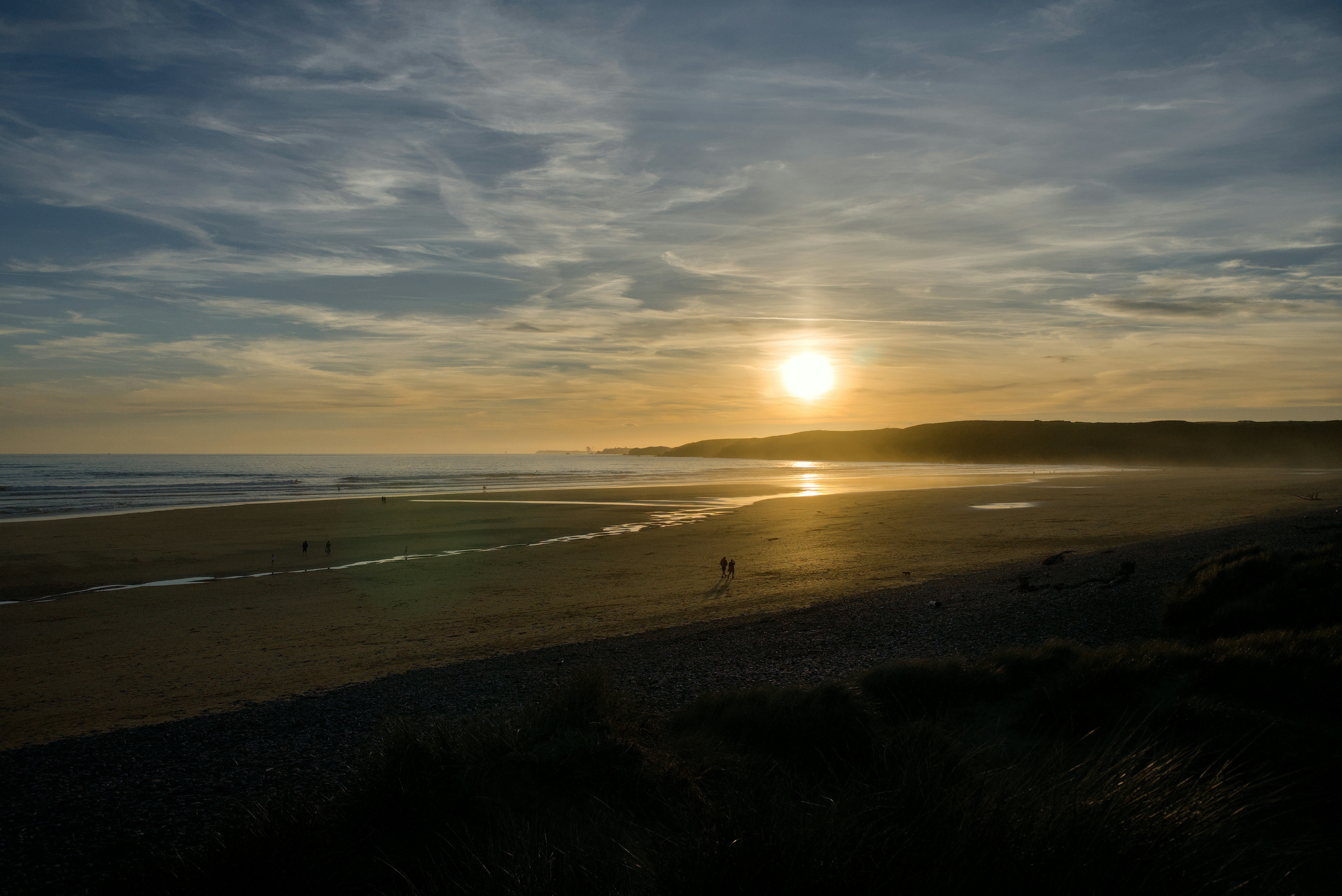 Sunset Over a Quiet Shore: Subtle Dusk Light on Dunes
