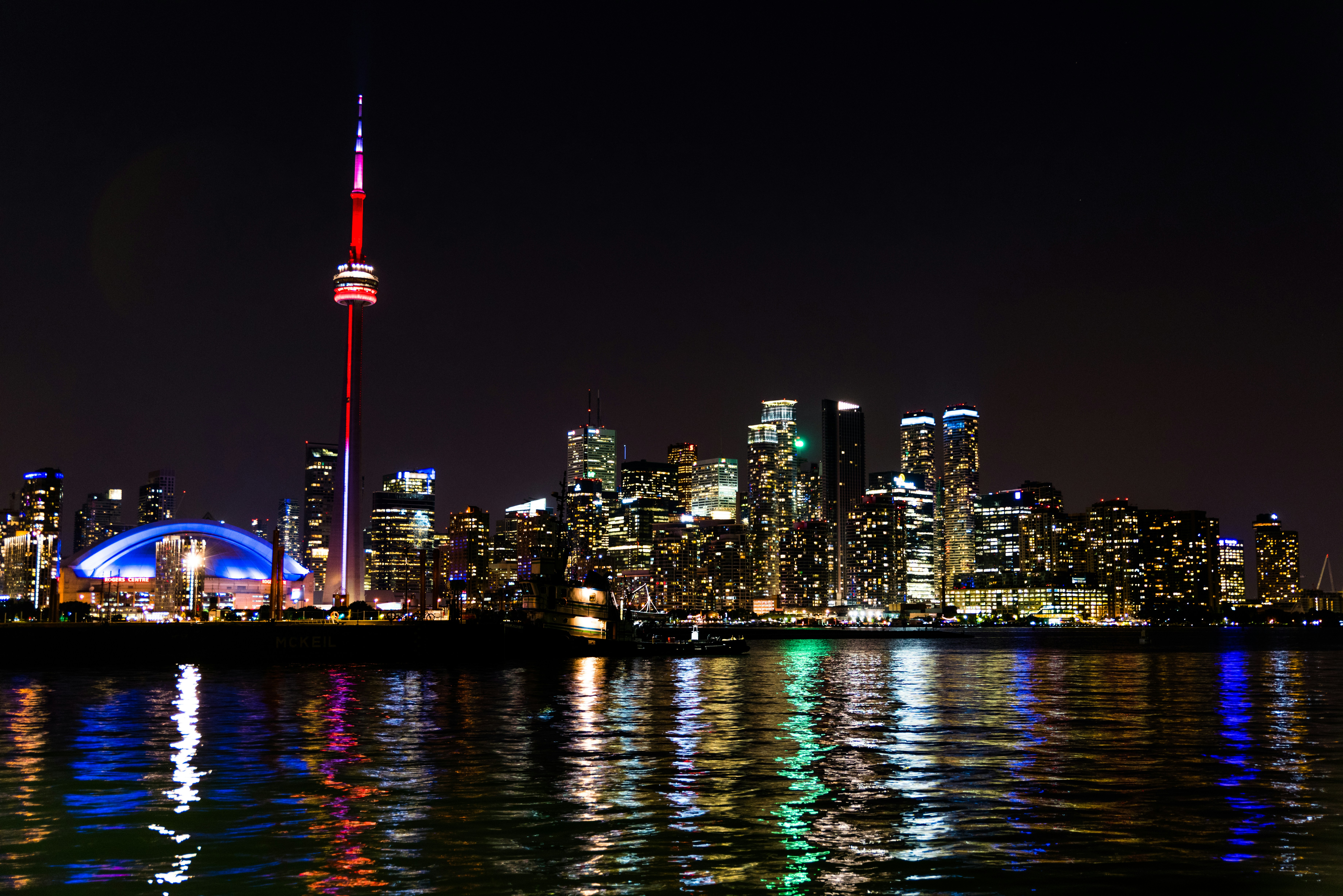 Nighttime Skyline: Reflections Dancing on the Harbour