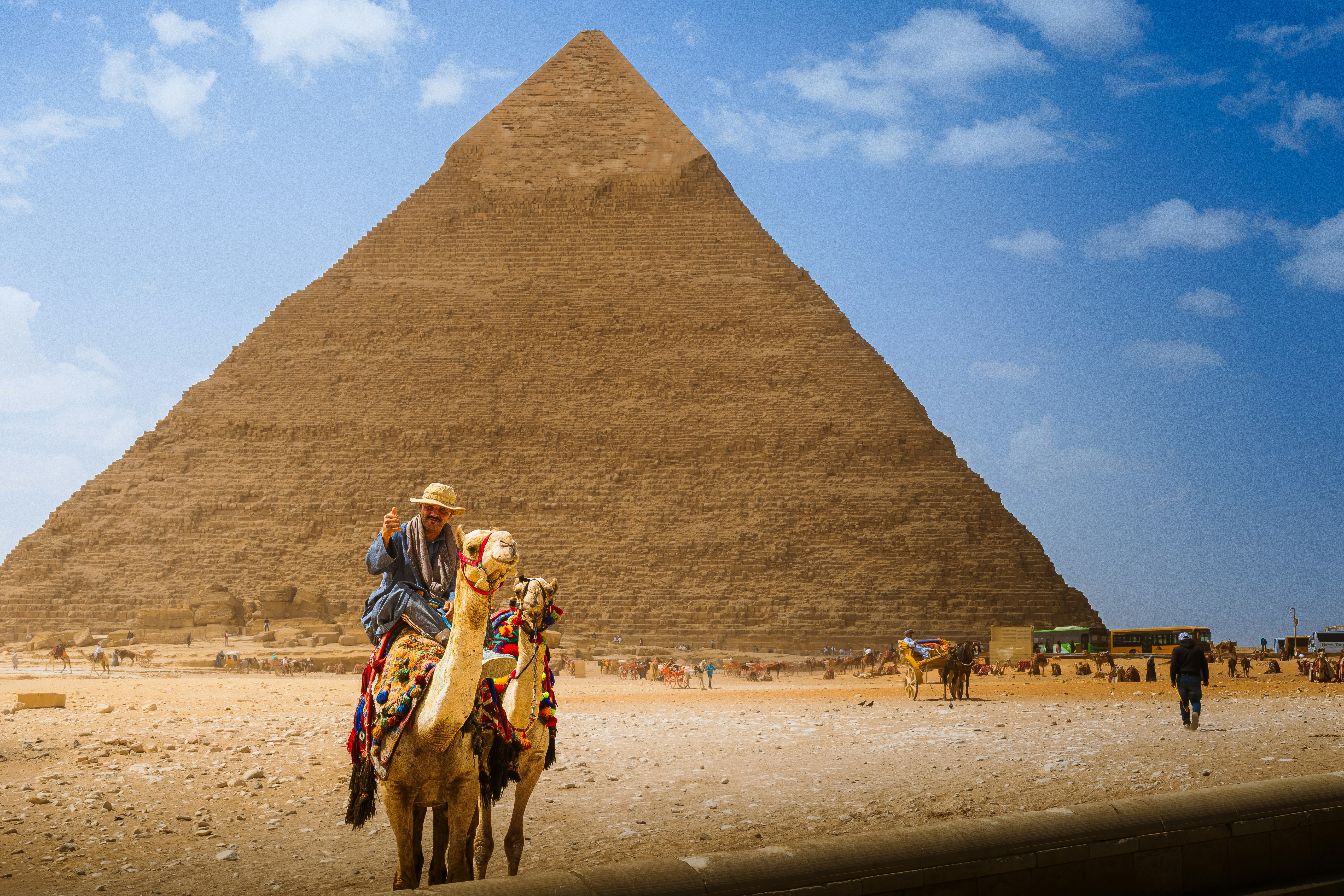 Camel Caravan before the Great Pyramid