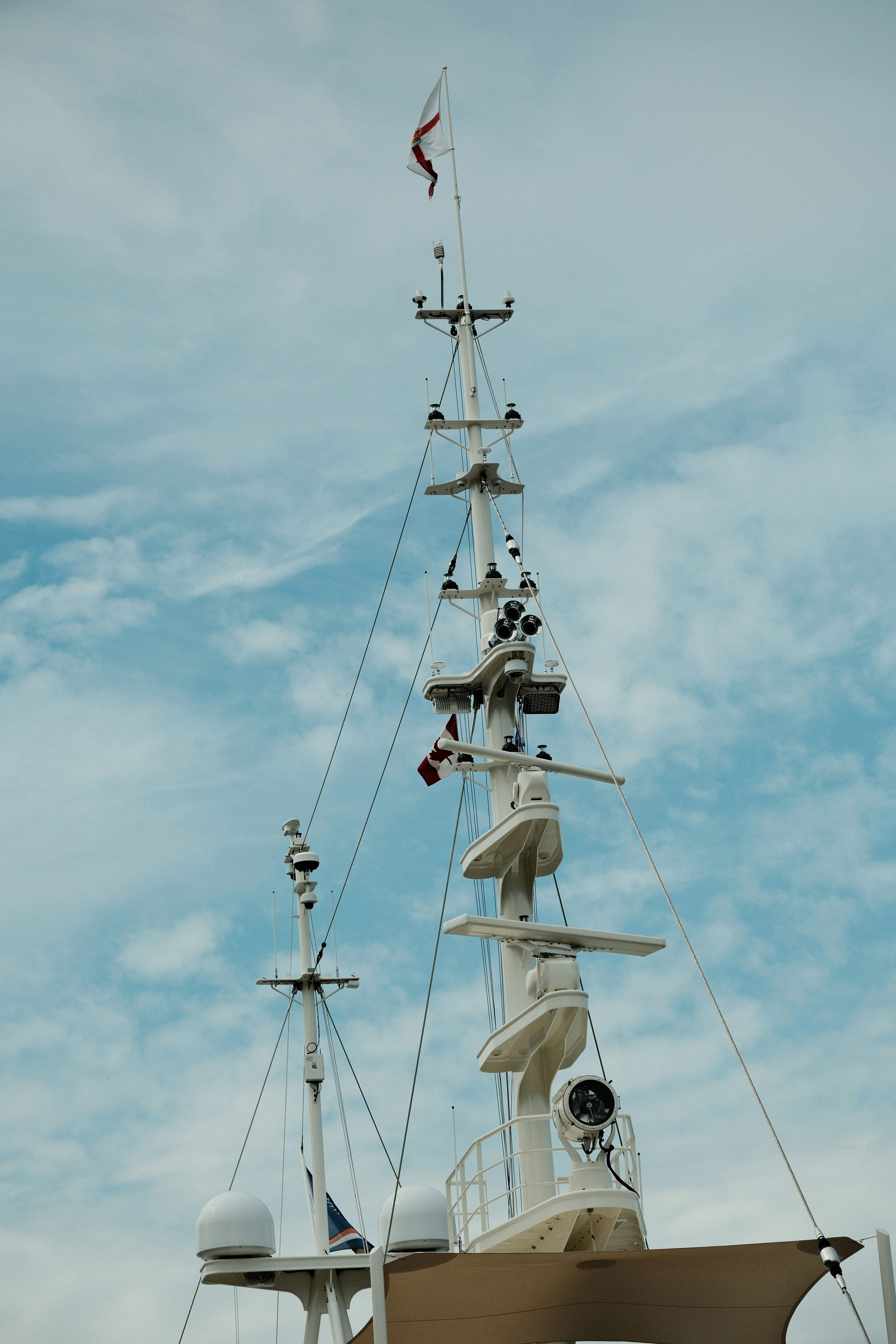 Masts Full of Motion: A Marina Tower Reaching Toward the Sky