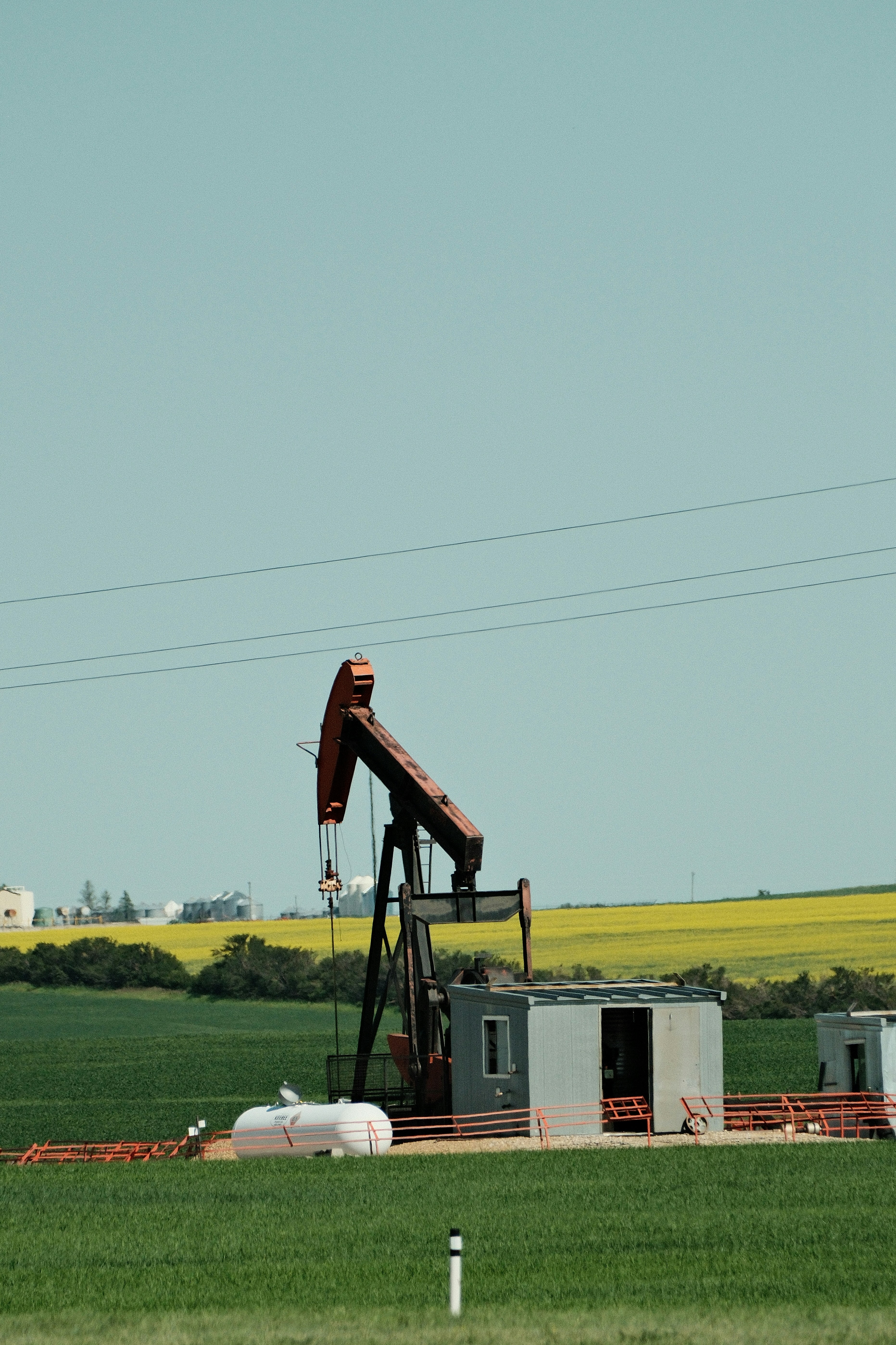 Field Terminal: An Oil Pump Set Against a Quiet Horizon