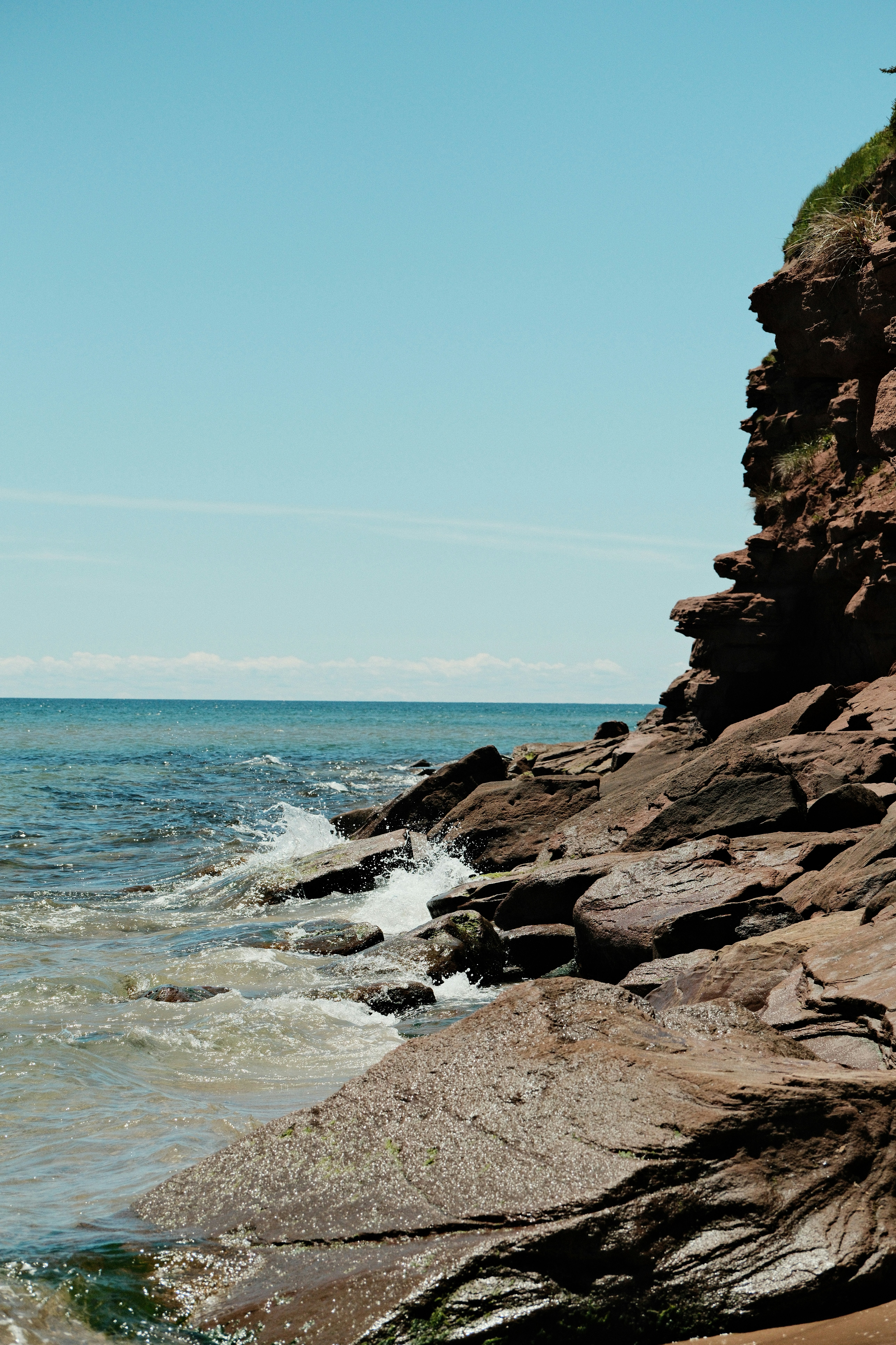 Rugged Cliffs Meet Ocean Blues
