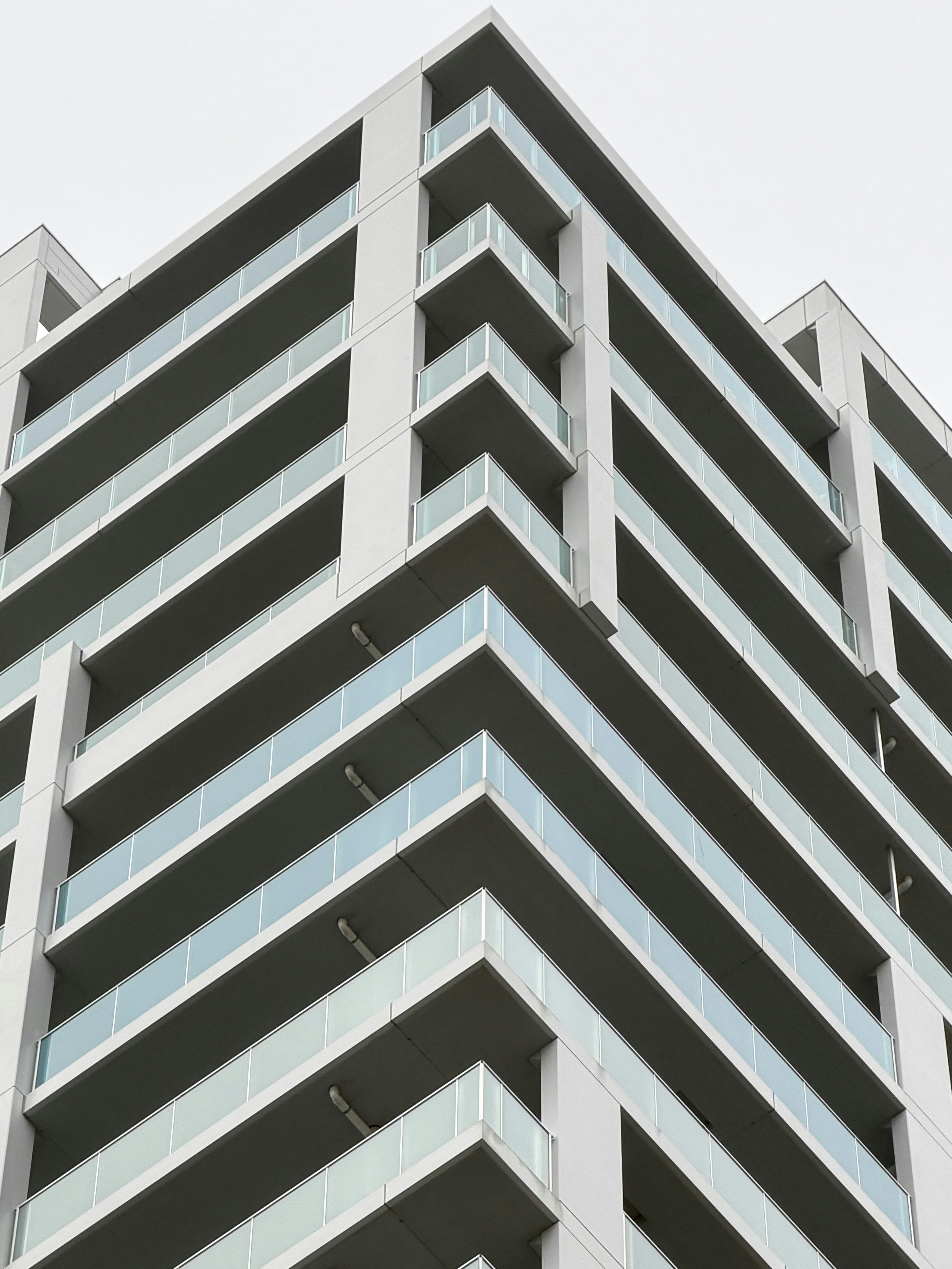 Tilted Geometry: A Prism of Balconies on a Modern High-Rire