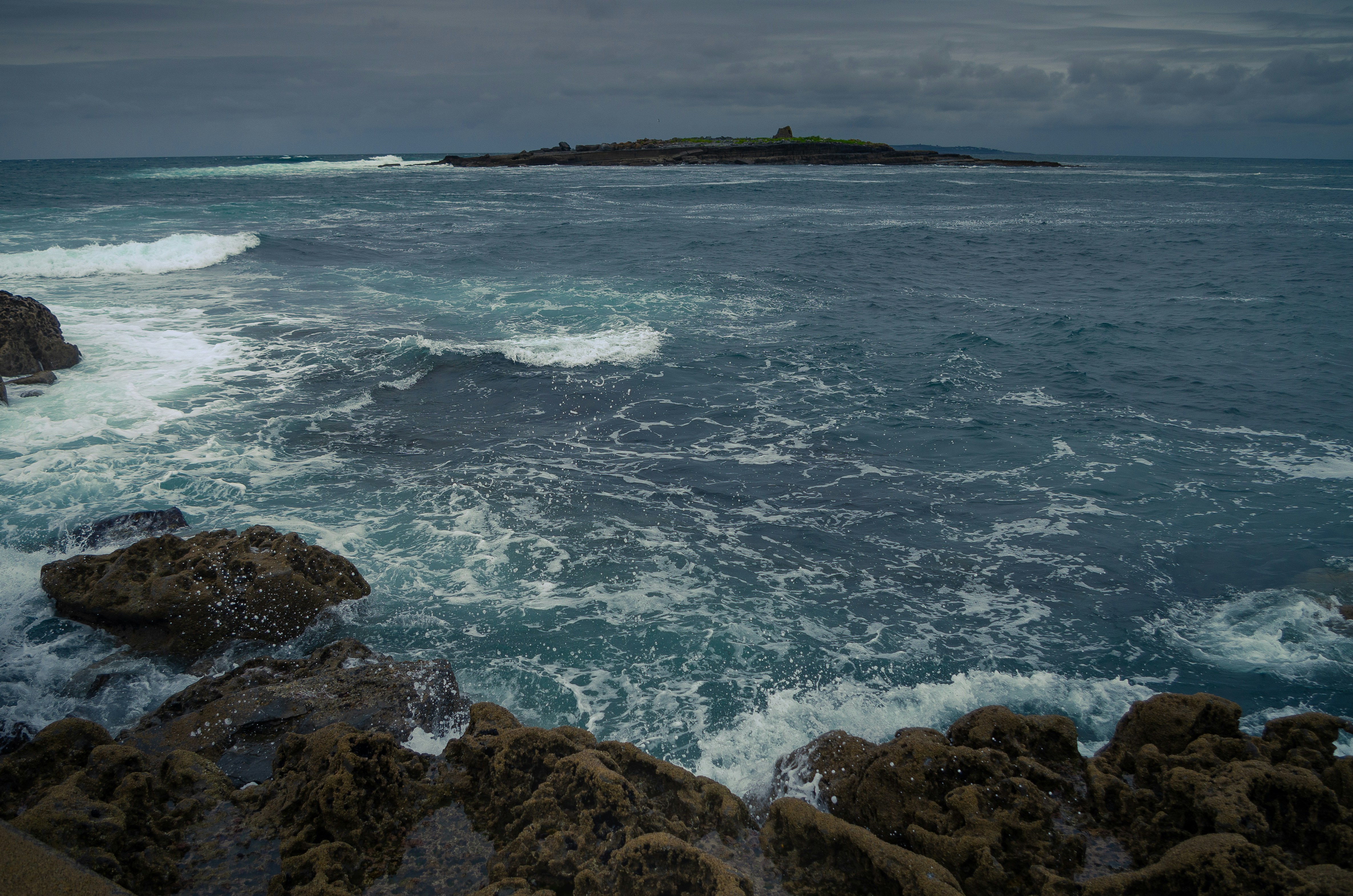 Storm-Tossed Sea from the Rugged Shoreline
