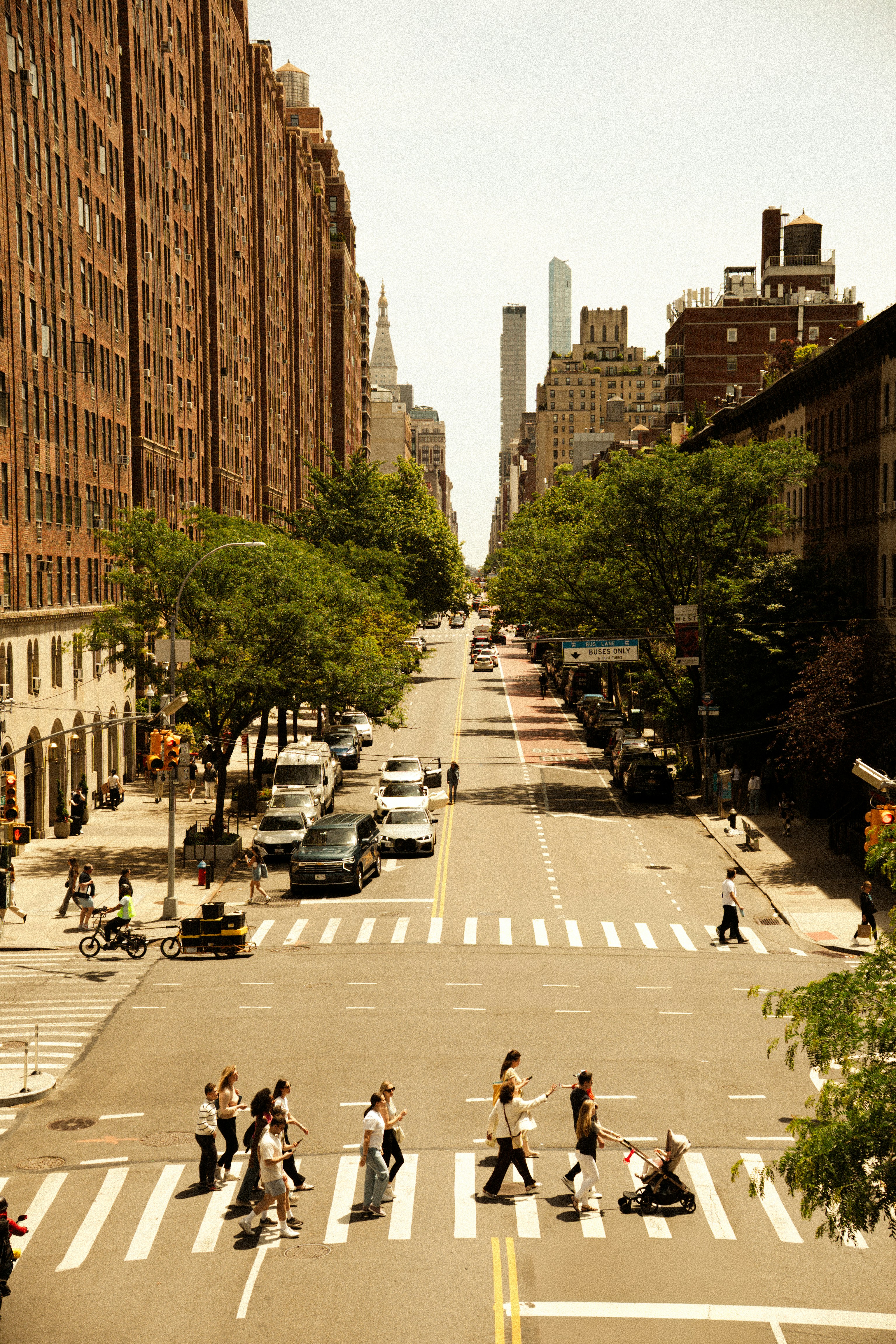 Urban Horizon: Pedestrians and Crosswalks marching toward Manhattan’s vanishing point
