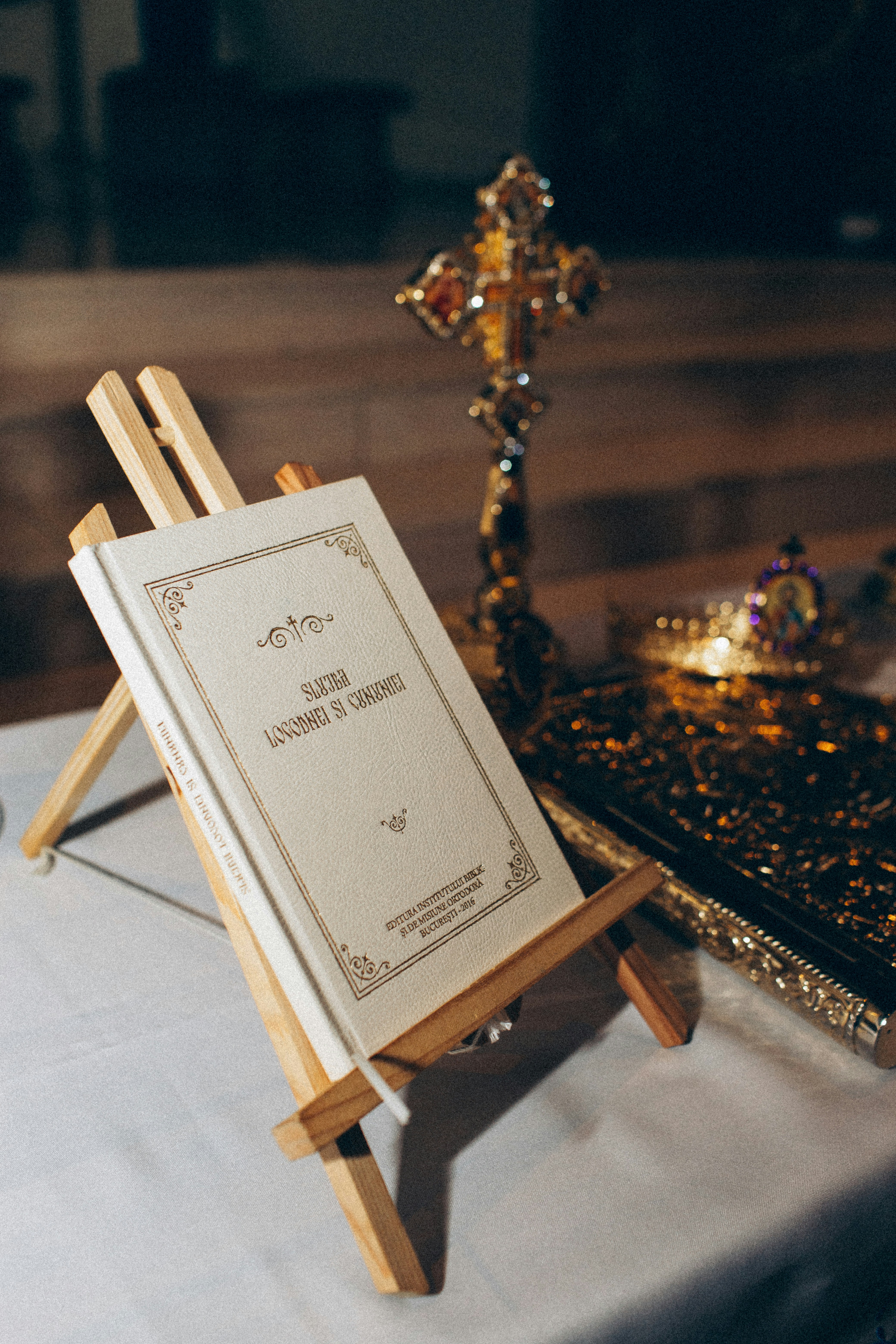 Miniature Altar, Book, and Ornate Cross: A Quiet Shrine Setup