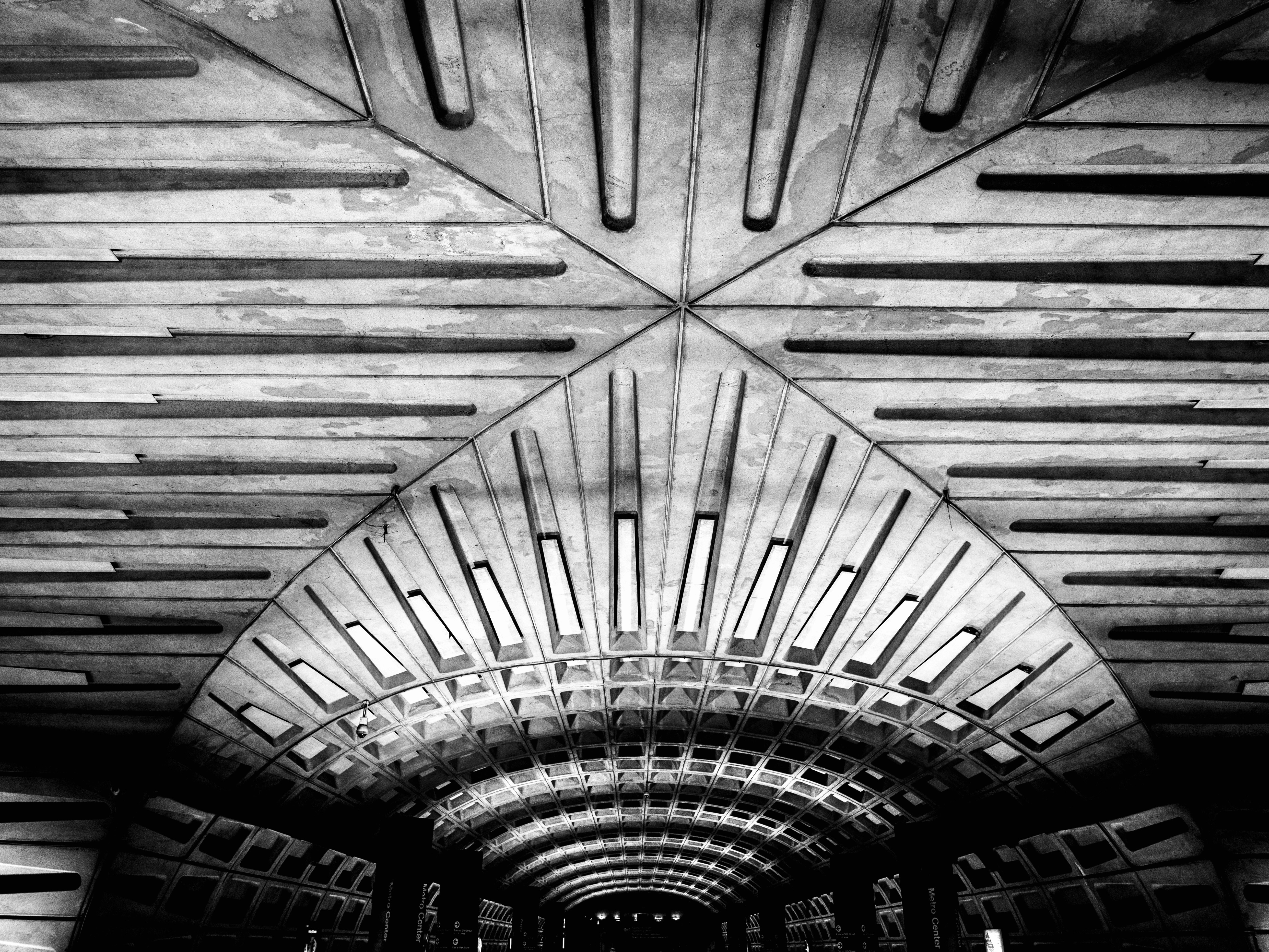 Converging Rails: An Industrial Tunnel Recedes into Light