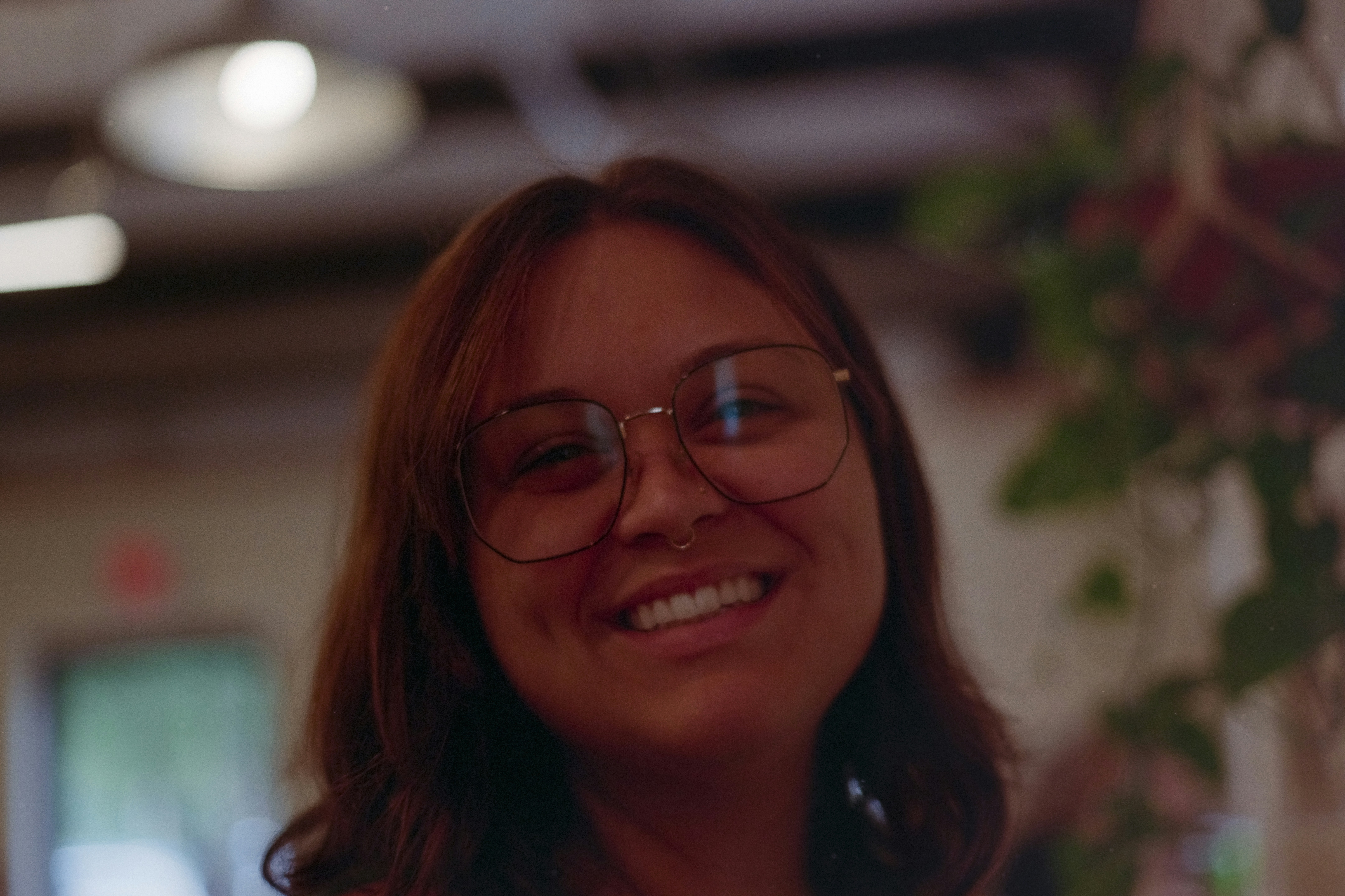 Smiling Portrait in Soft Indoor Glow