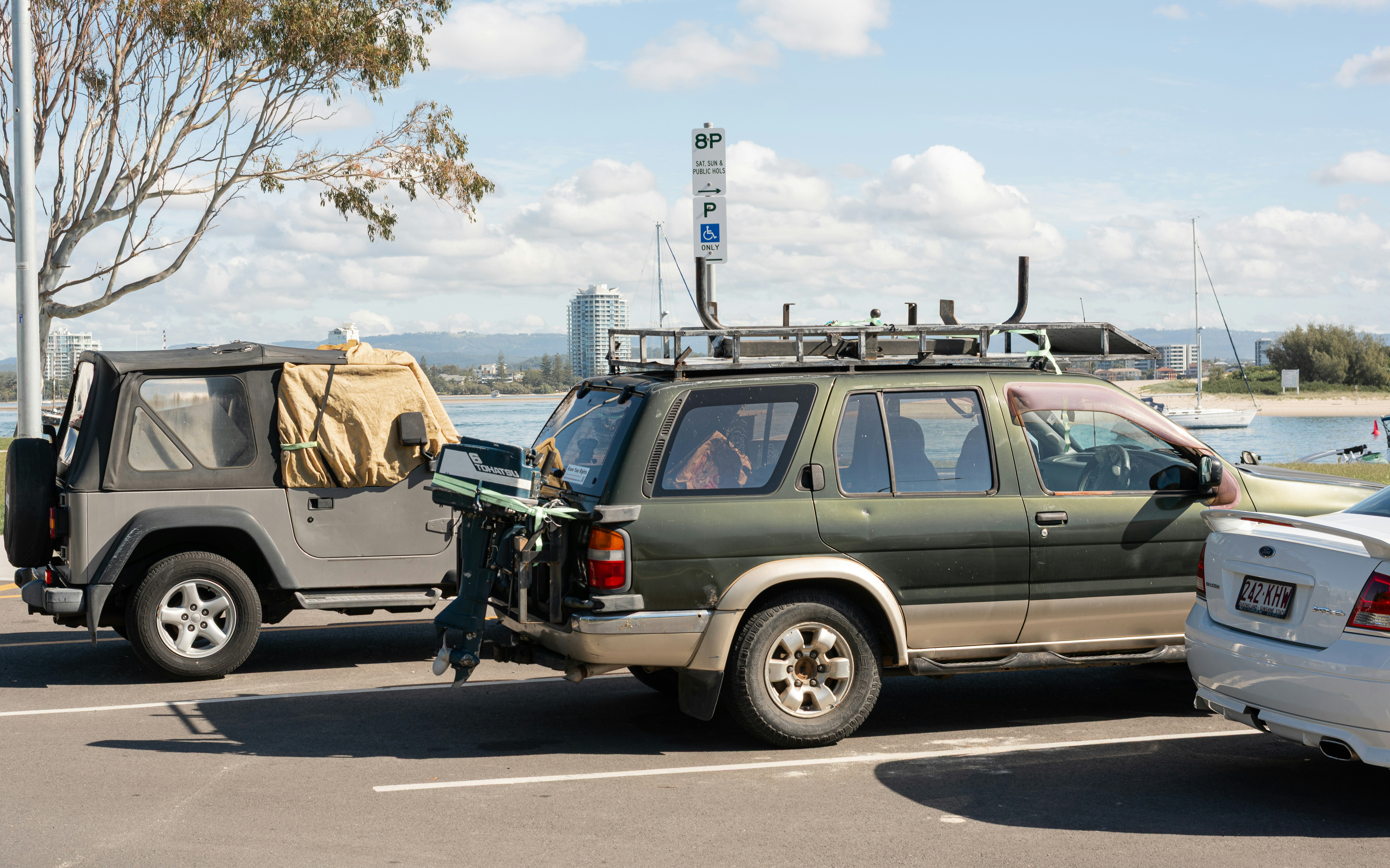 Offshore Parking: A tan-topped SUV Ready for the Next Adventure