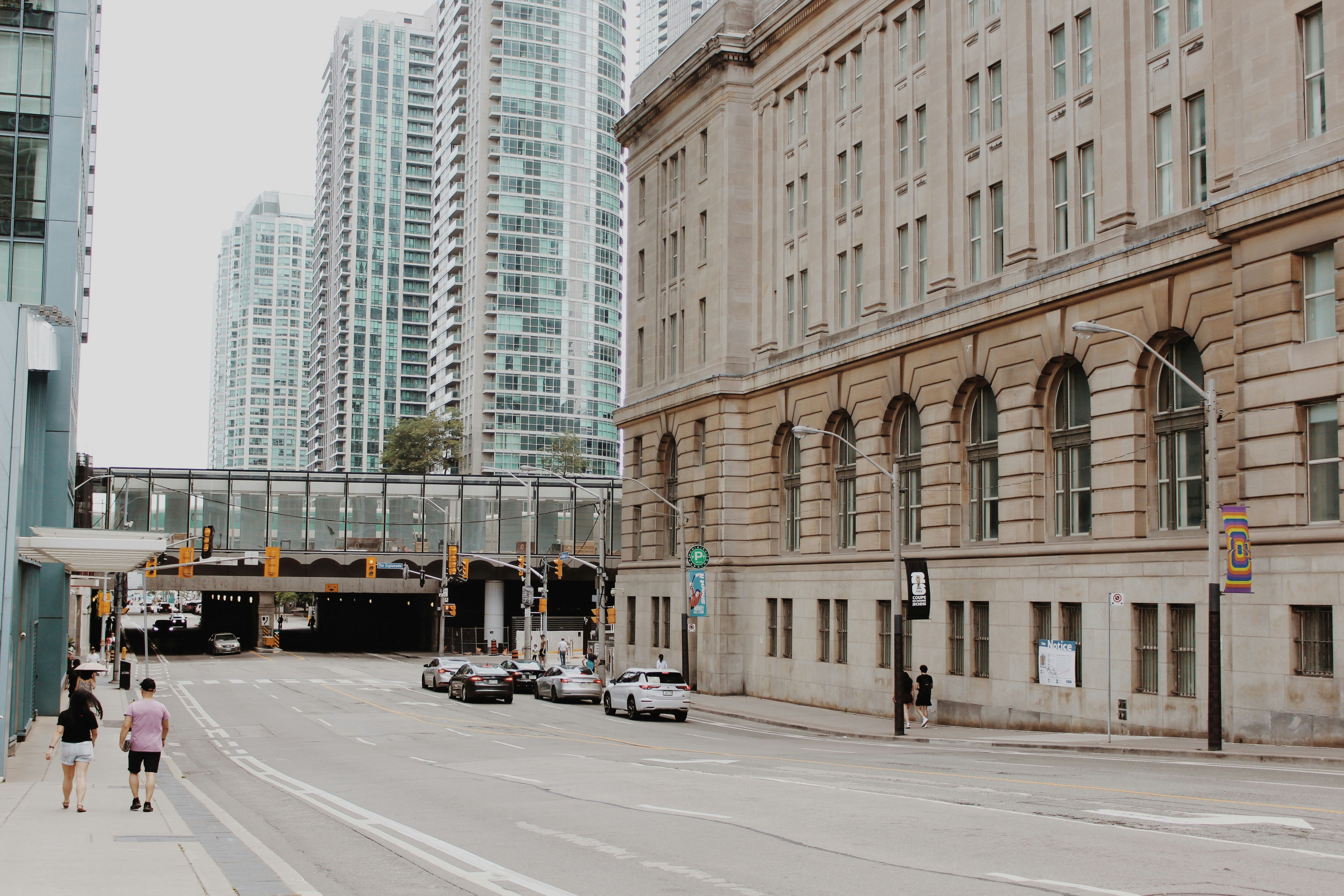 City Street Archways: A Quiet Corner Under Tall Facades