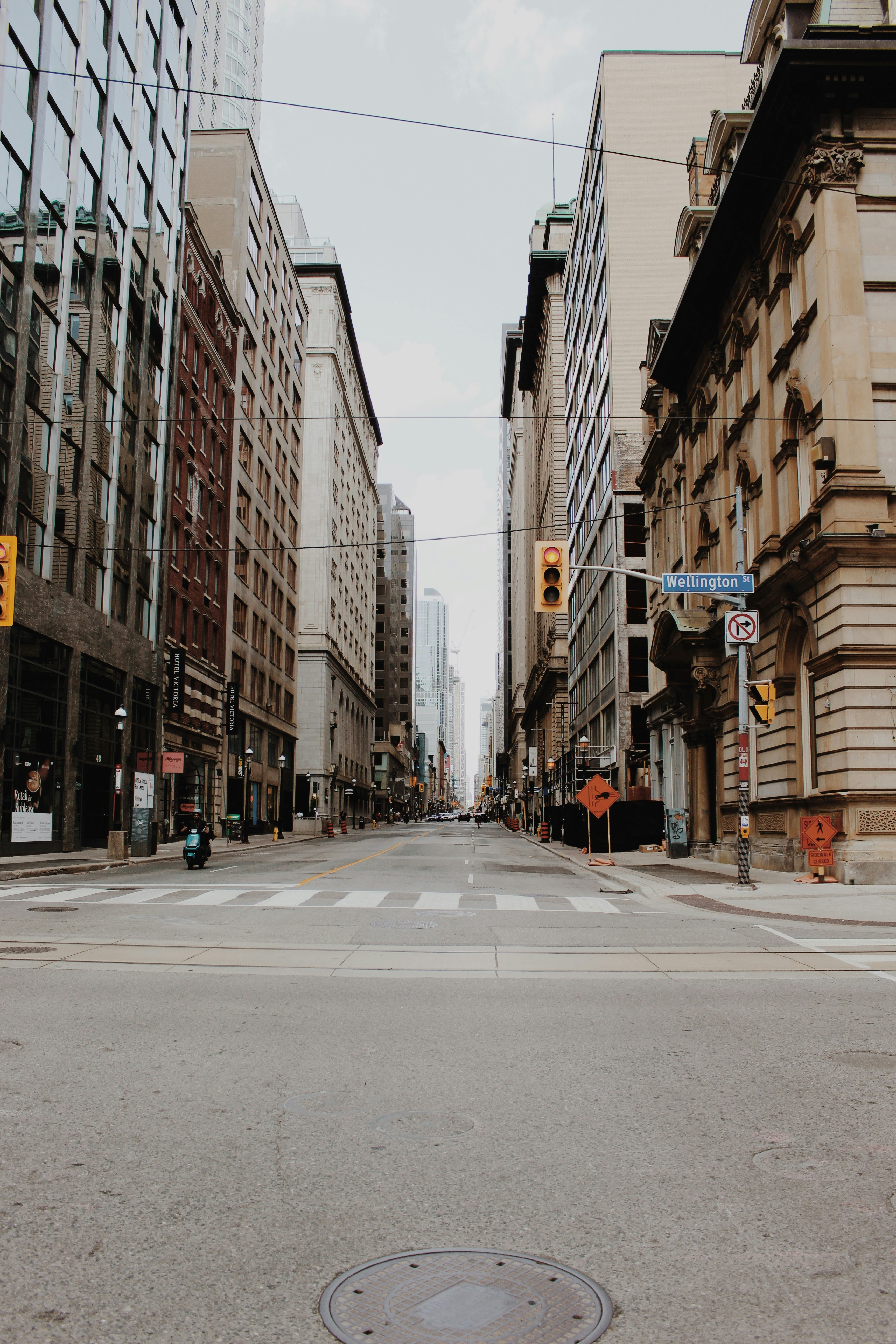 Urban Canyon: Street View Reaching Toward the Distant Skyline